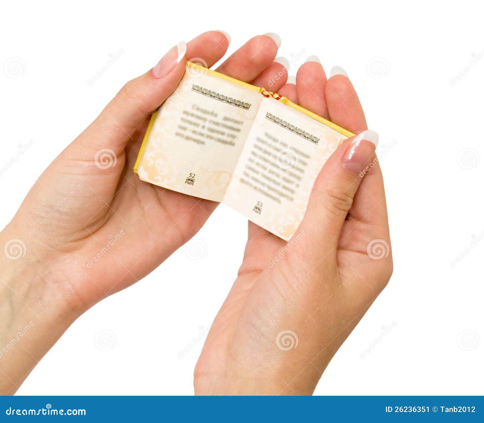 A Small Old Book Opened On The Table. Opened Aged Book Lit With Light ...