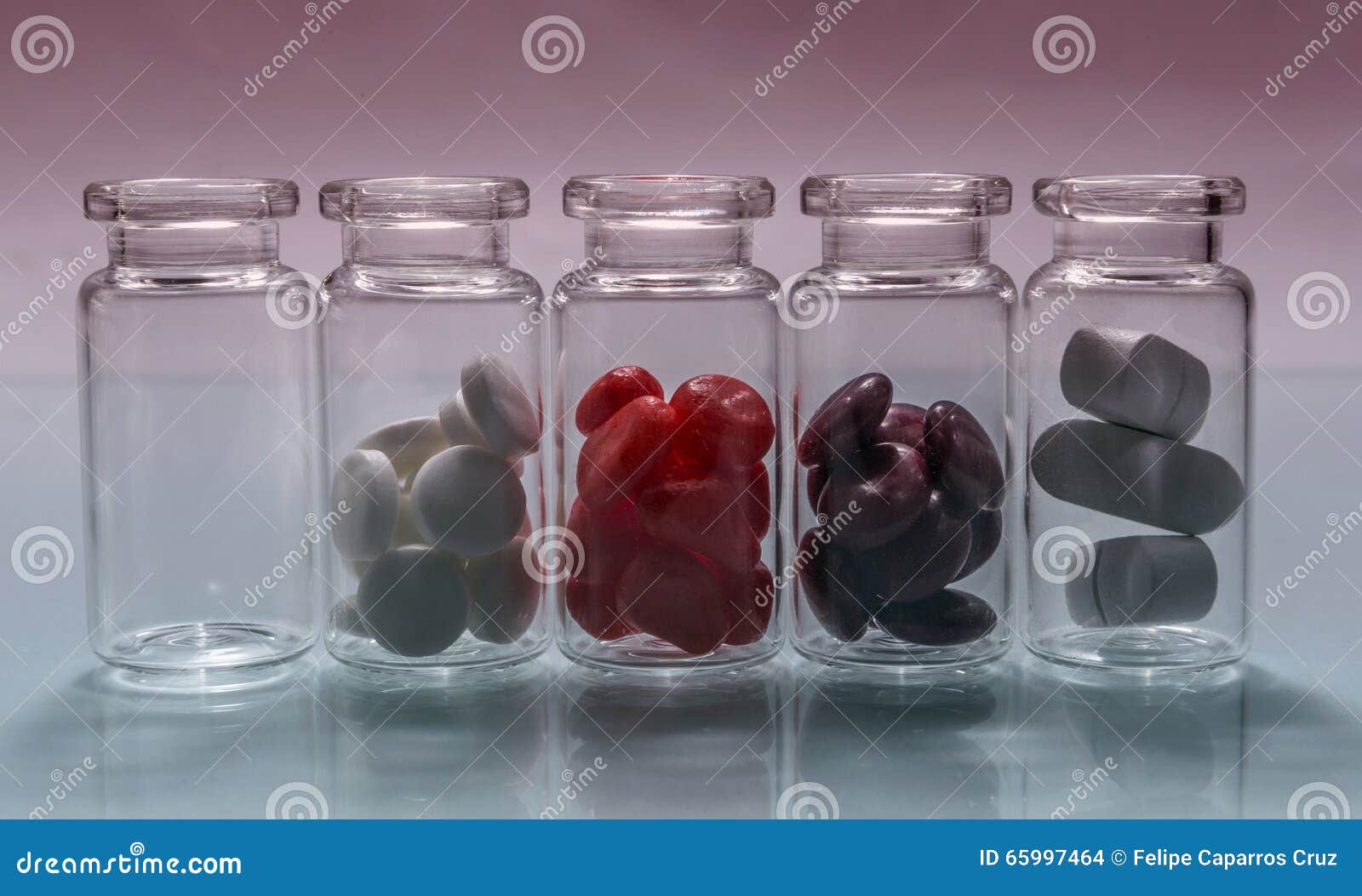 Small Bottles of Diferent Pills Stock Photo - Image of medical ...