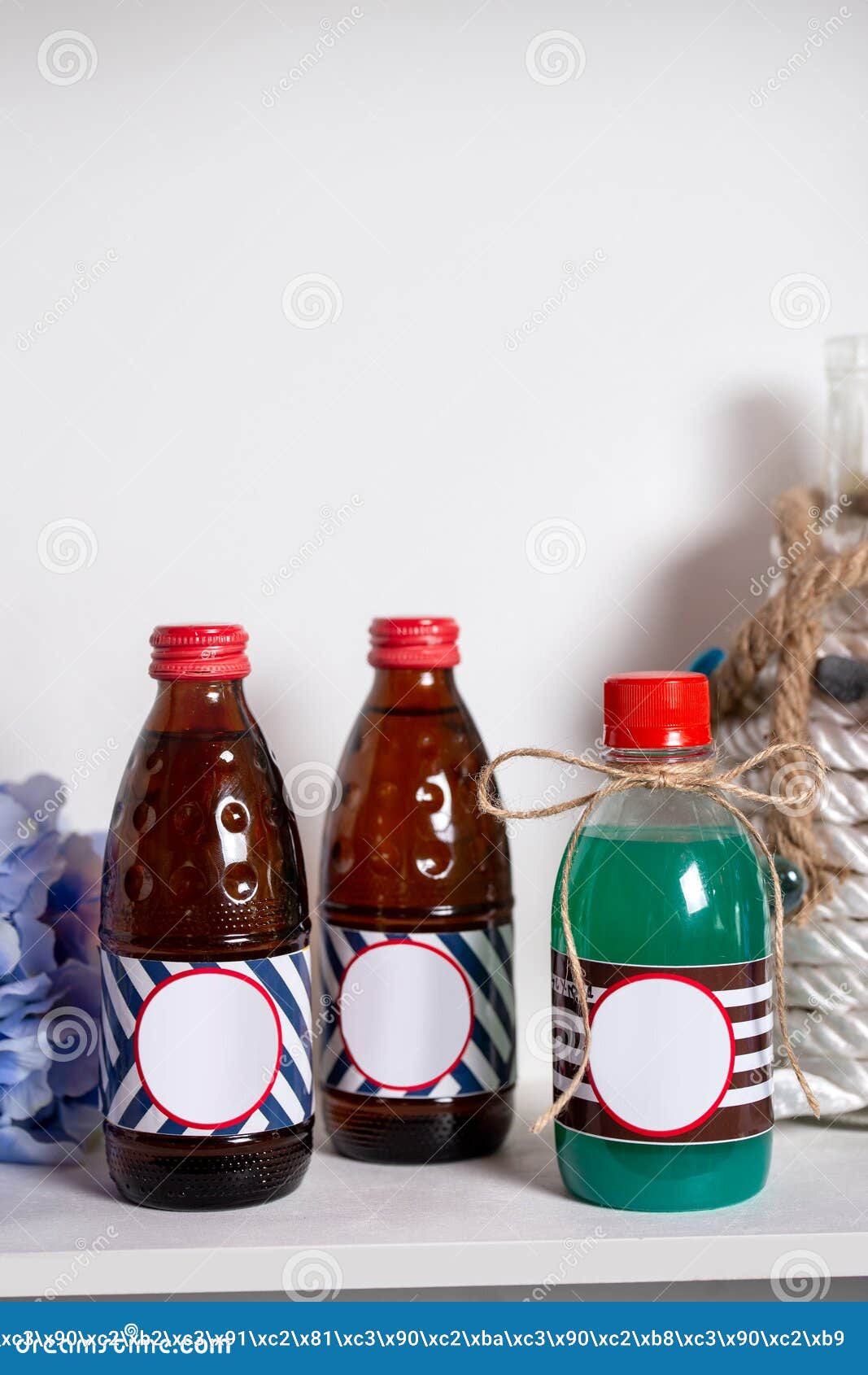 Small Bottles with Drinks are a Place for a Logo Stock Image - Image of ...