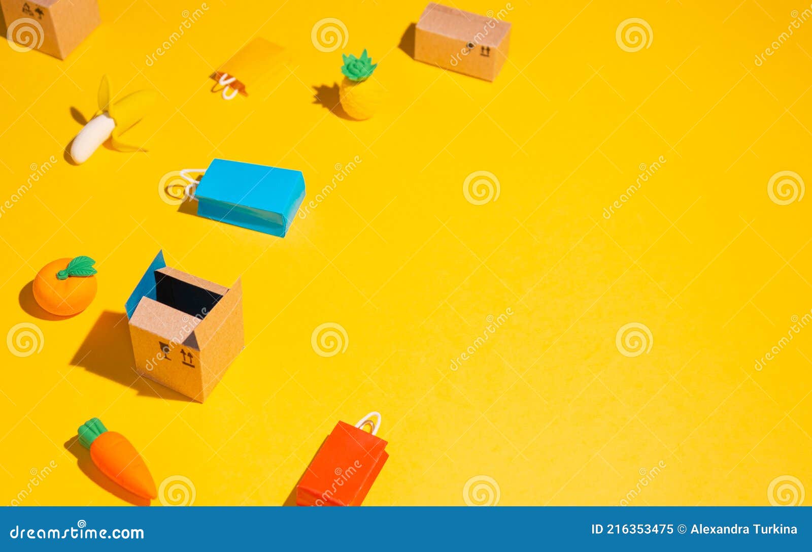 Small Boxes, Fruits and Packages on a Yellow Background. Free Space for ...