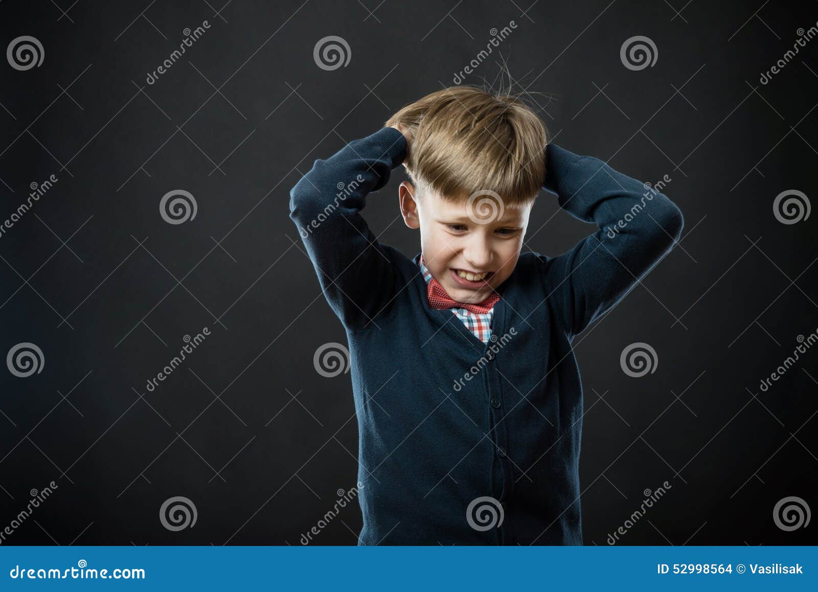 Small boy in despair stock photo. Image of black, background - 52998564