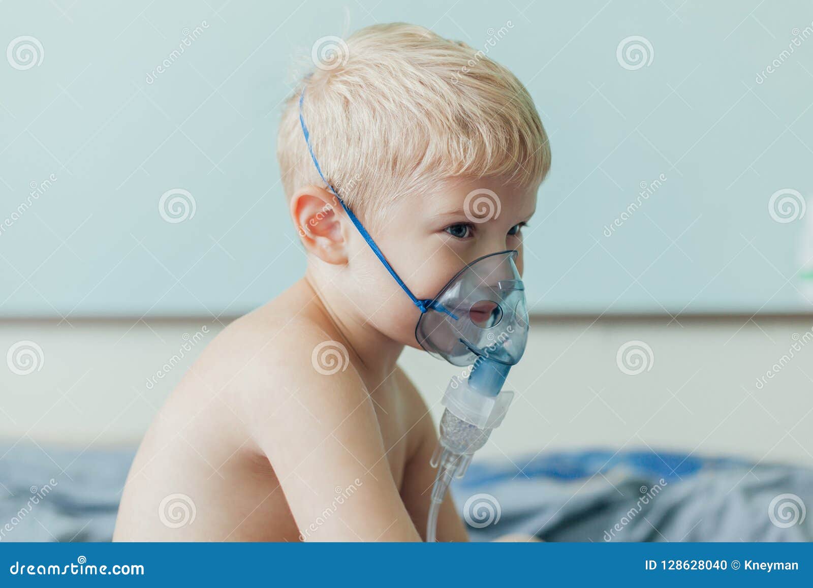 Small Boy Does Therapeutic Inhalation Using a Nebulizer Stock Photo ...