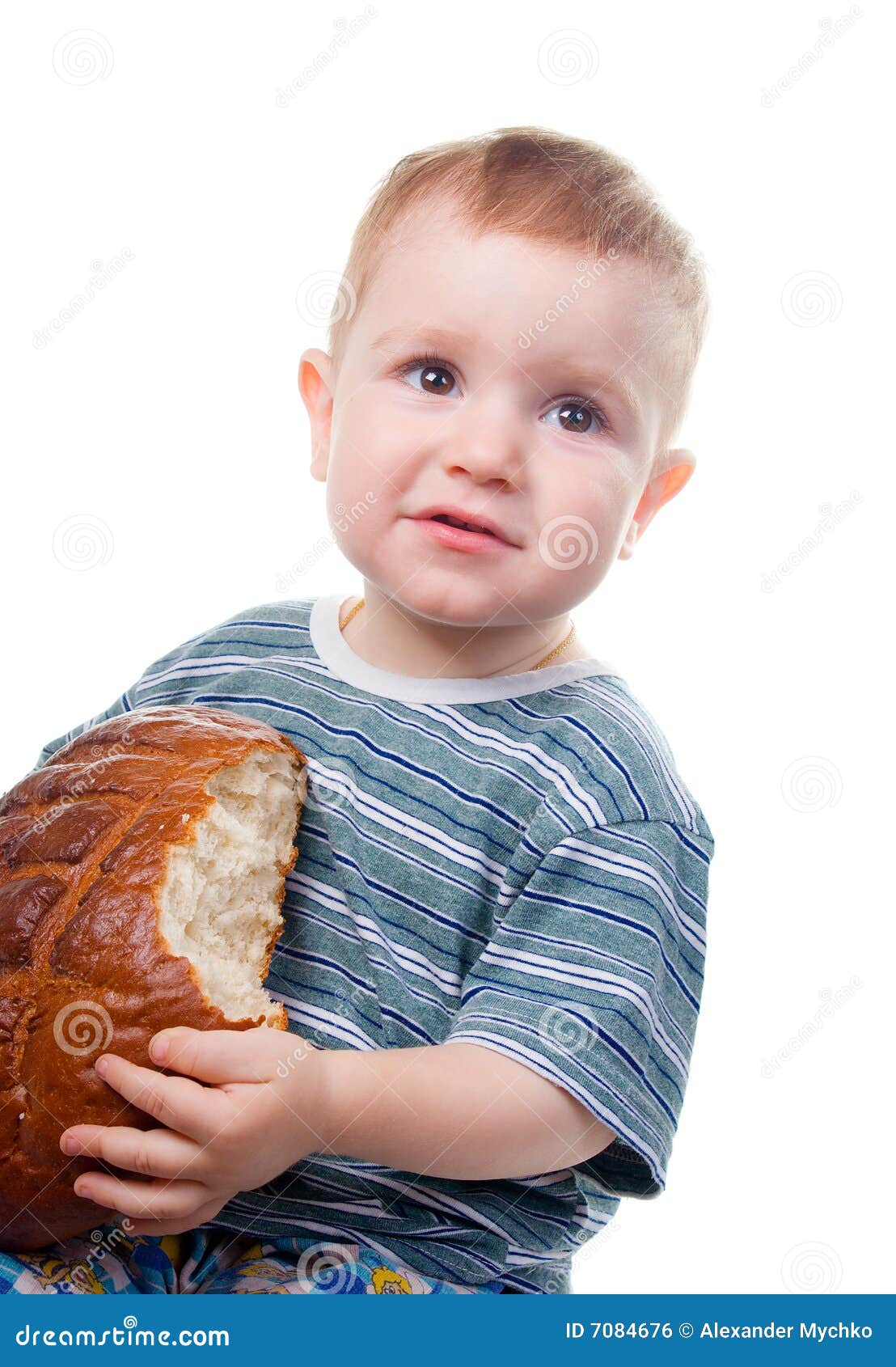 Small boy eating a bread. stock photo. Image of tasty - 7084676