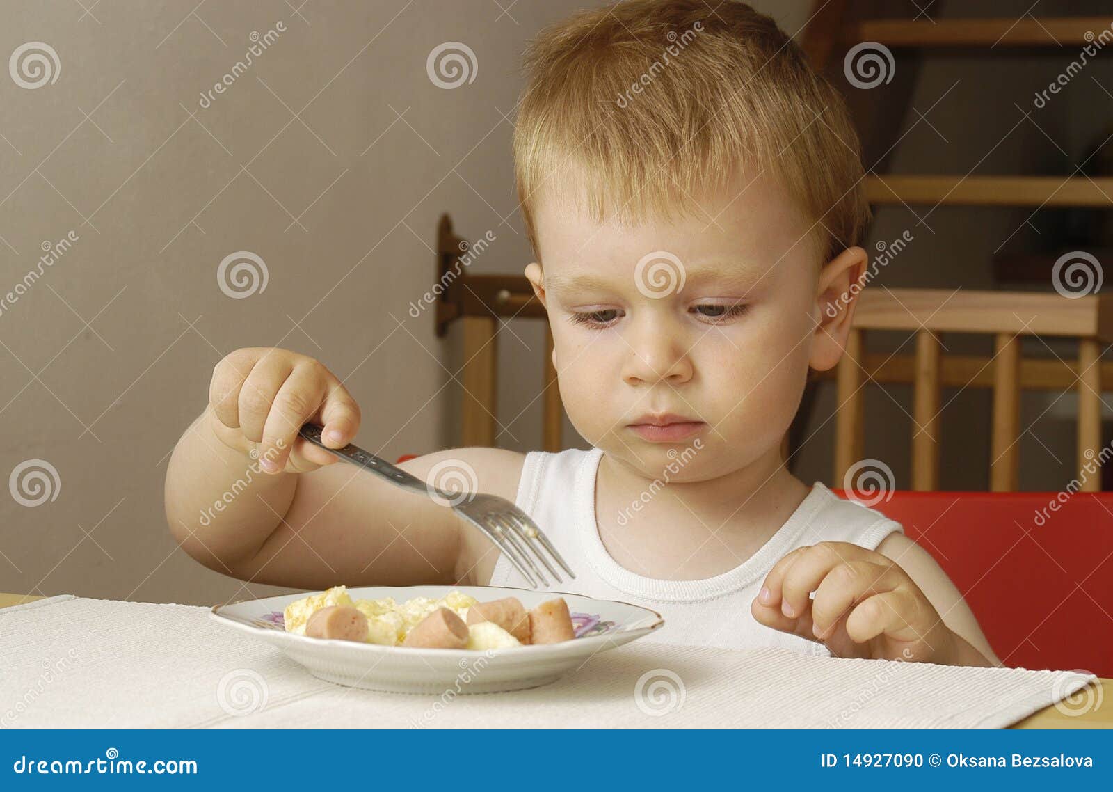 Small boy eats dinner stock photo. Image of small, plate - 14927090