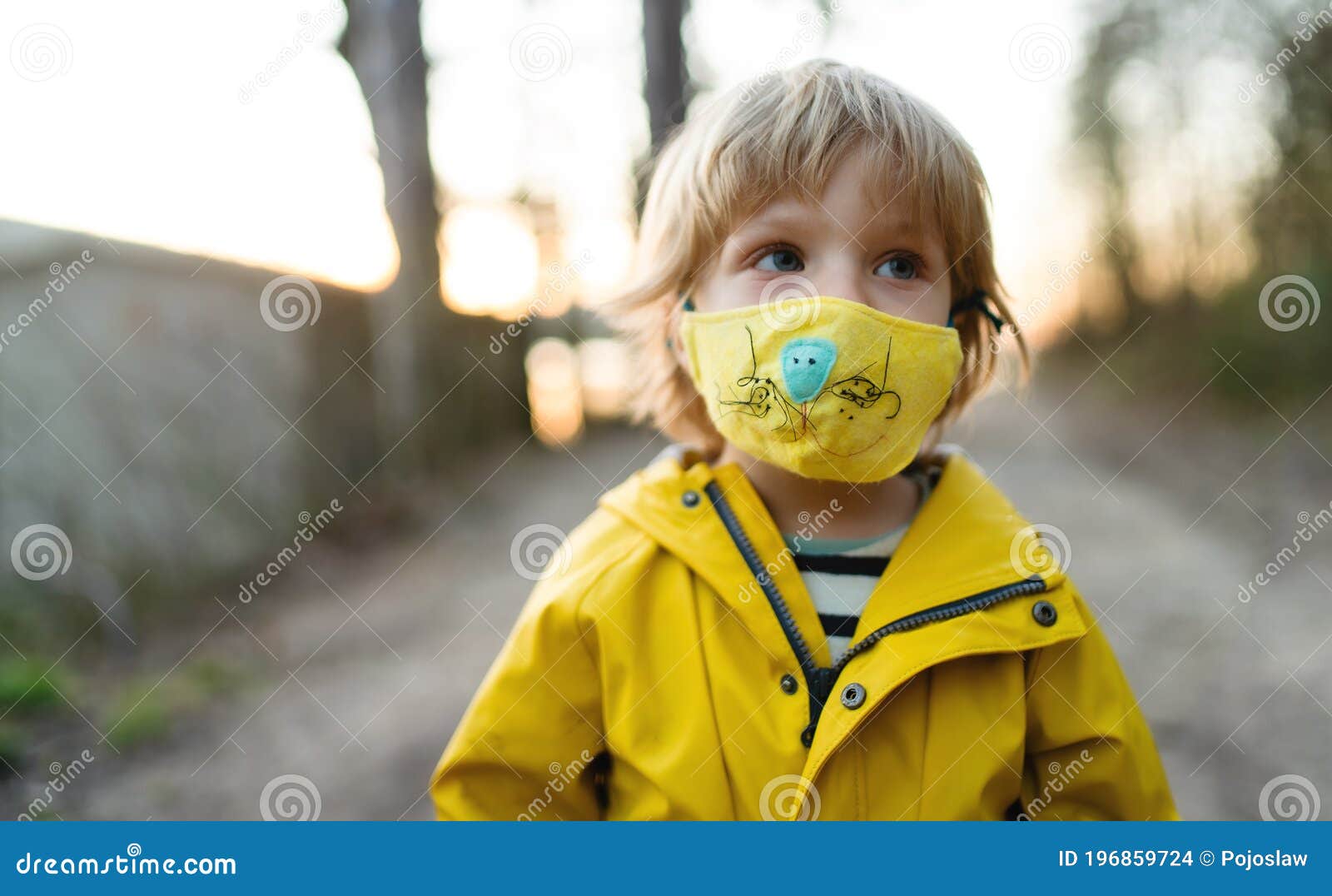 Small Boy with Face Mask Outdoors in Nature, Walking. Stock Photo ...