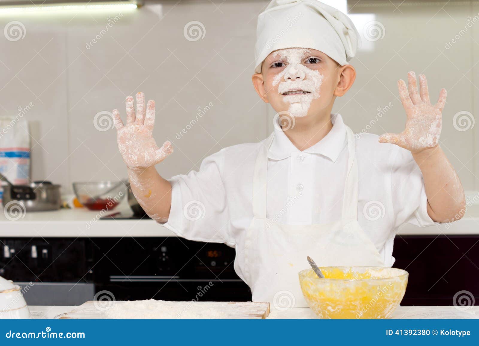 Small Boy Having Fun Coking in the Kitchen Stock Photo - Image of ...