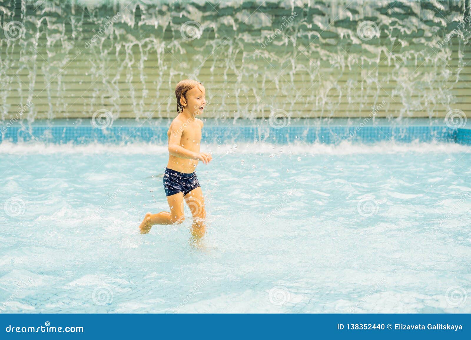 Small Boy Having Fun Runing in Swimming Pool Stock Photo - Image of ...