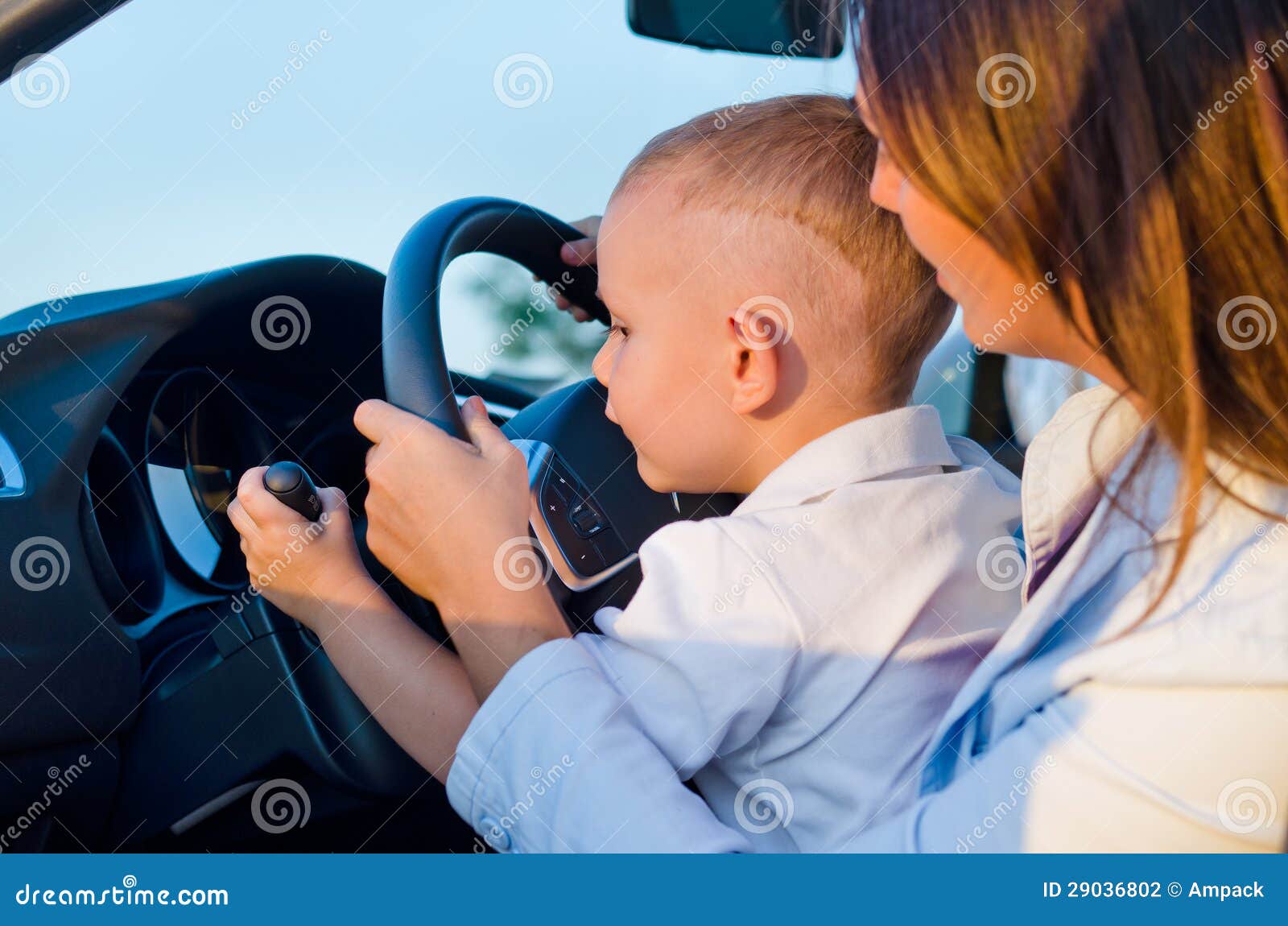 Small Boy Learning To Drive Stock Photo - Image of female, attractive ...