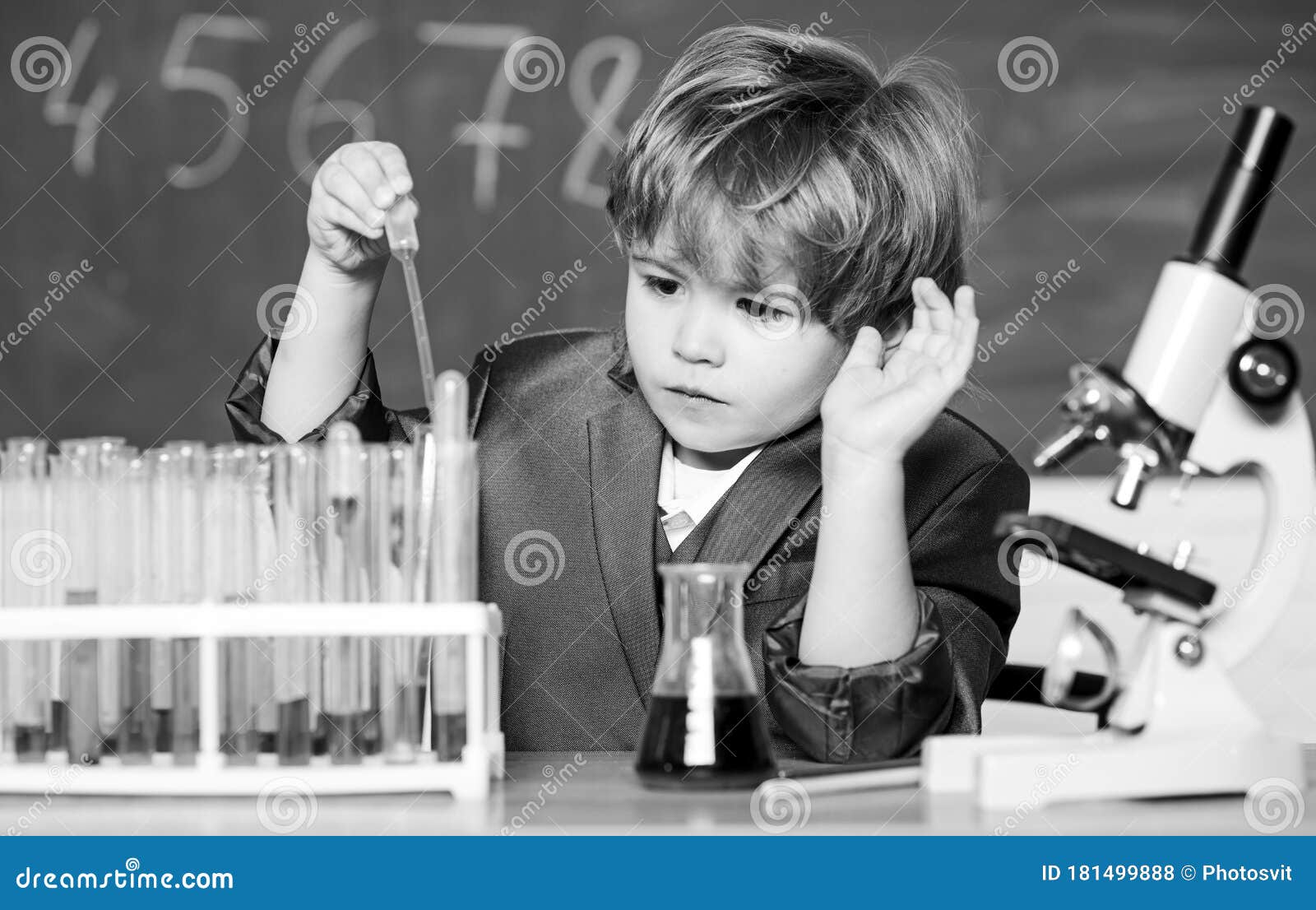Small Boy with Microscope at School Lesson. Student Do Science ...
