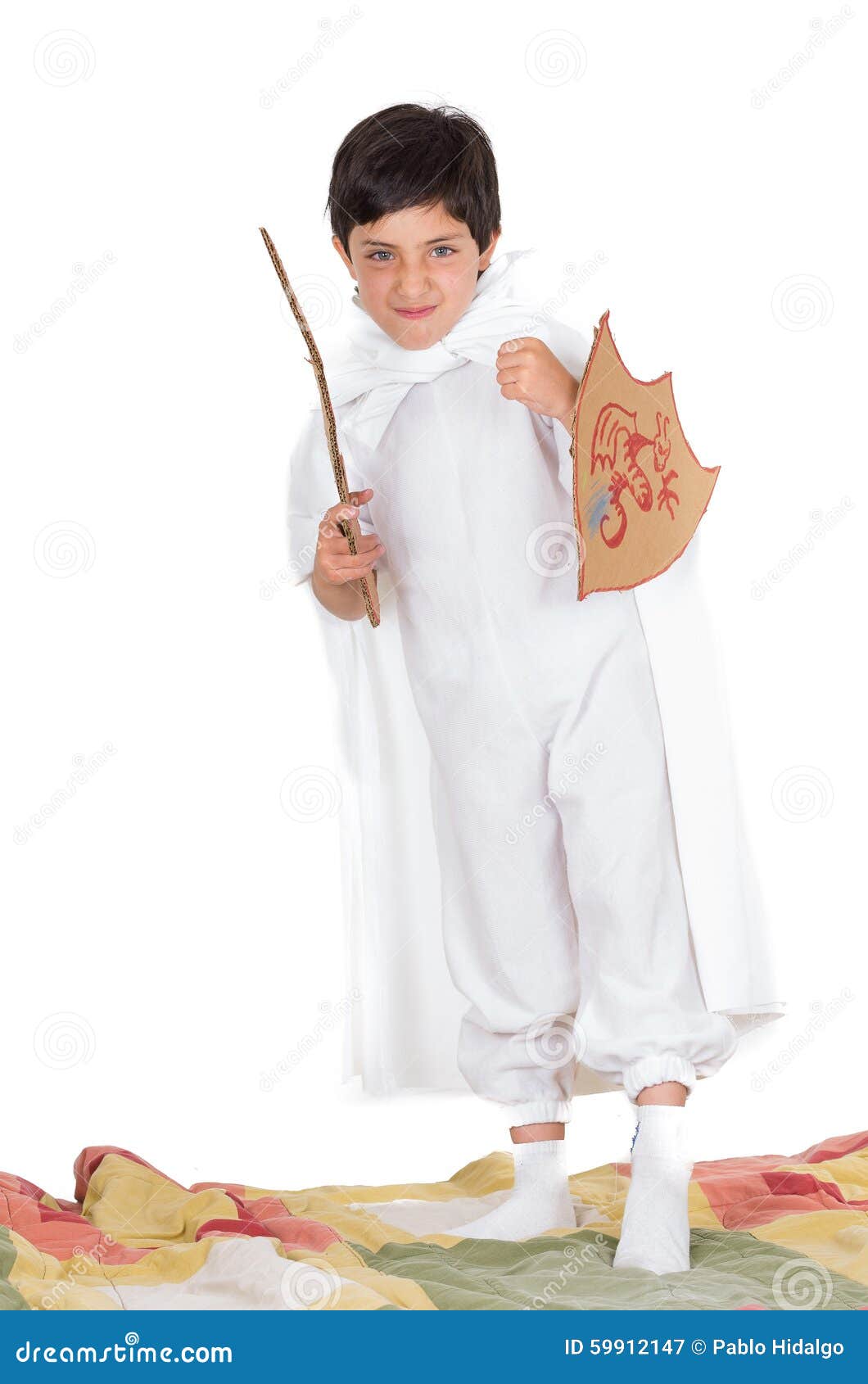 Small Boy Posing in All White with Homemade Shield Stock Image - Image ...