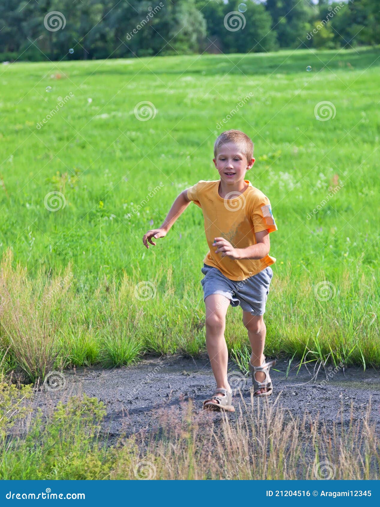 Small Boy Running on Green Meadow Stock Photo - Image of caucasian ...