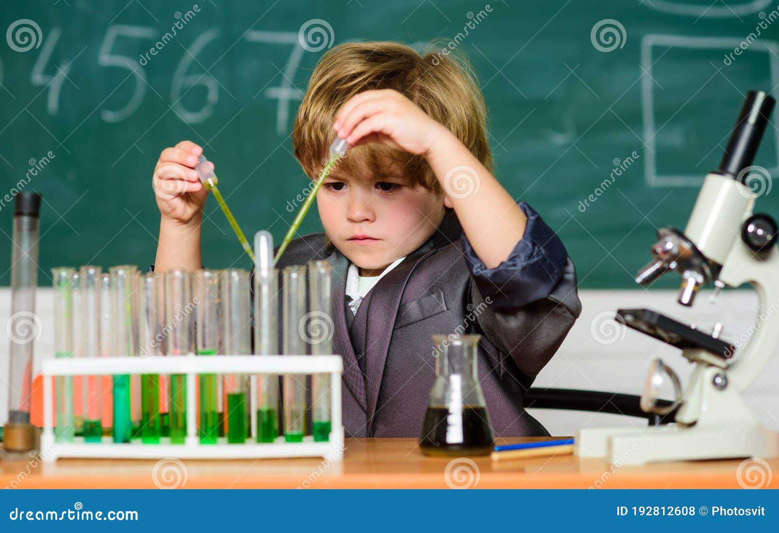 Small Boy at Science Camp. Microscope at Lab. Scientific Experiment ...