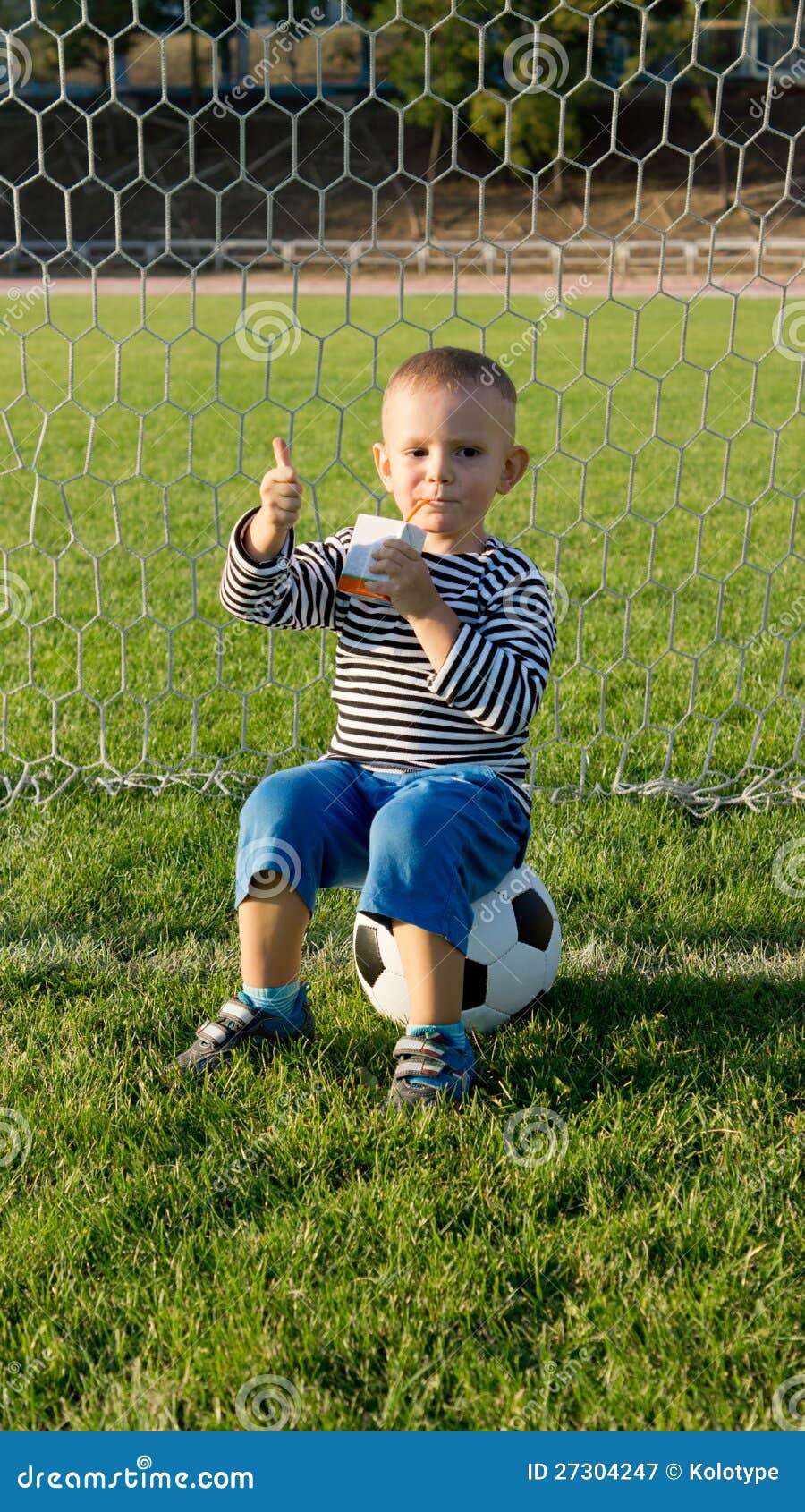 Small Boy Sitting on Soccer Ball Stock Image - Image of childhood ...