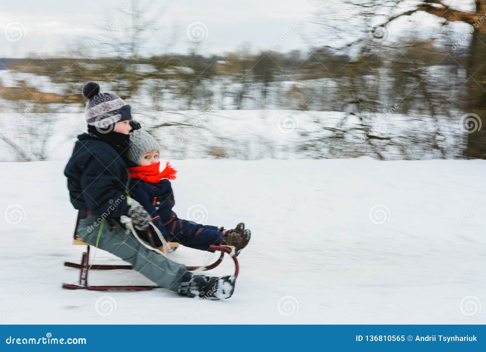 Small Boy Sledding at Winter Time. Motion Blur Stock Image - Image of ...