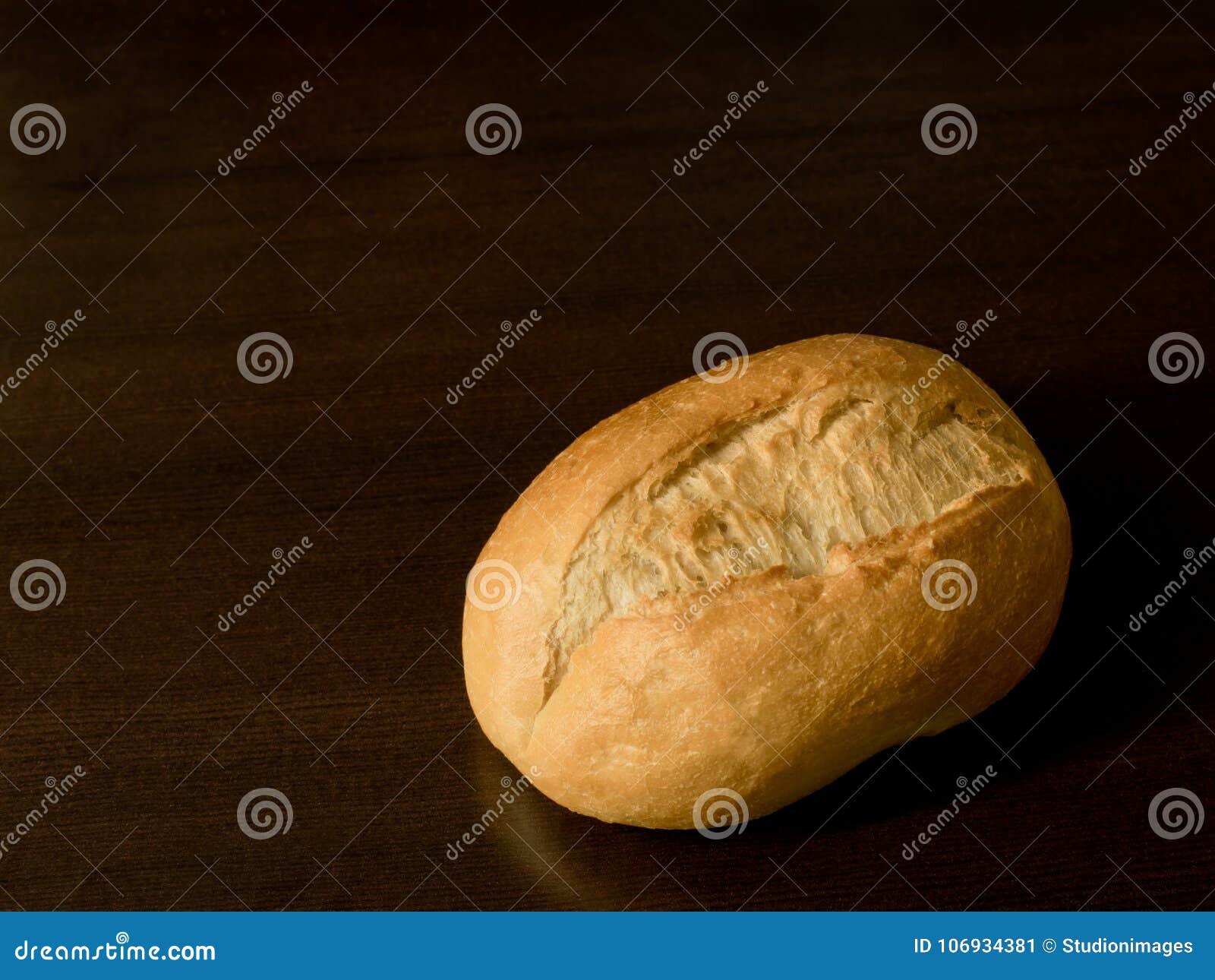 Small Bread Roll, BrÃ¶tchen - Breakfast Roll - on Dark Background Stock ...
