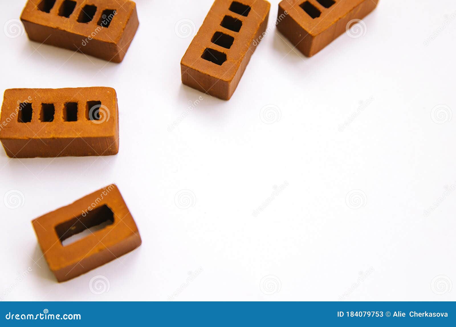Small Bricks are Scattered on a White Background. Children`s ...