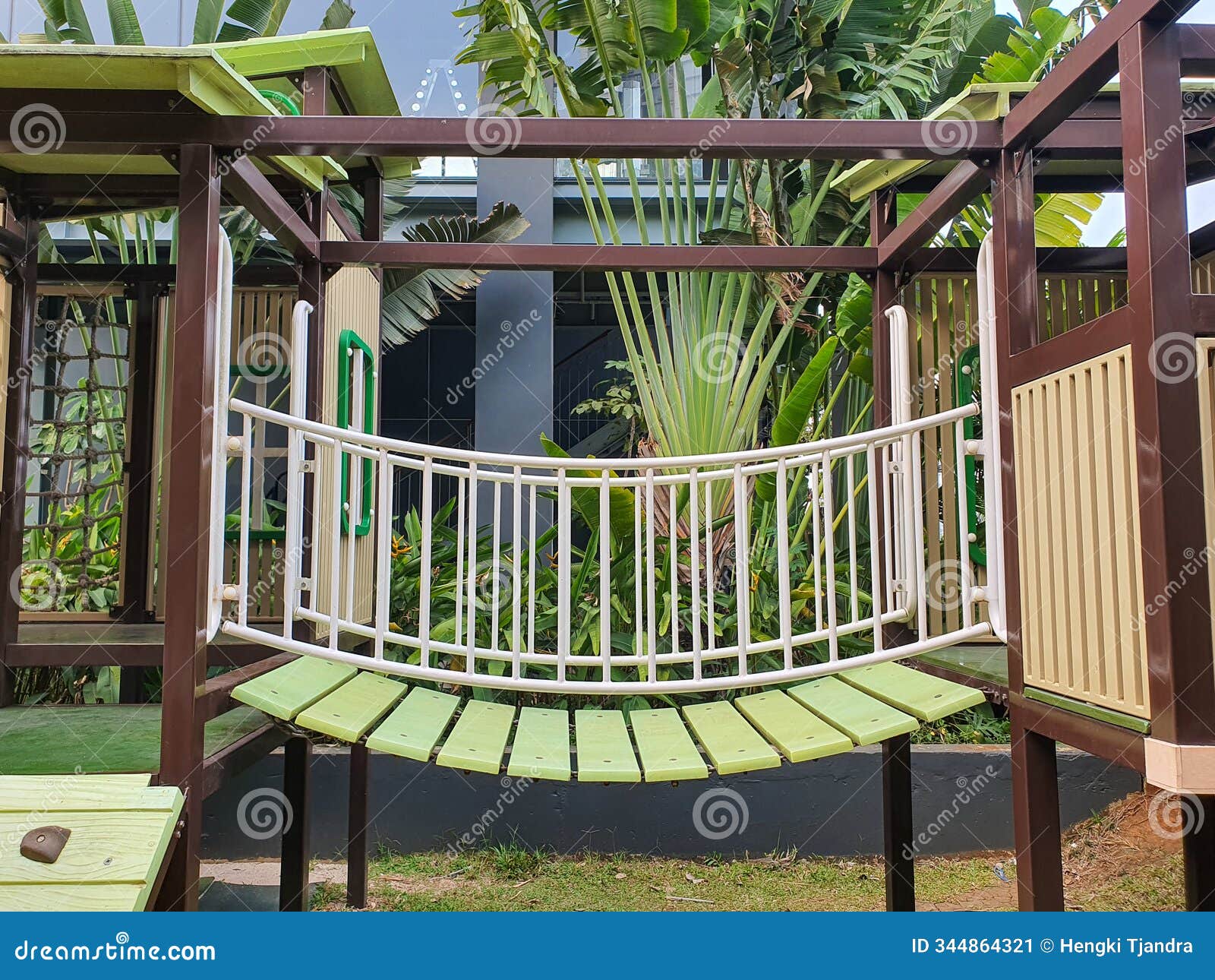 A Small Bridge Connecting Two Wooden Play Structures in a Children ...
