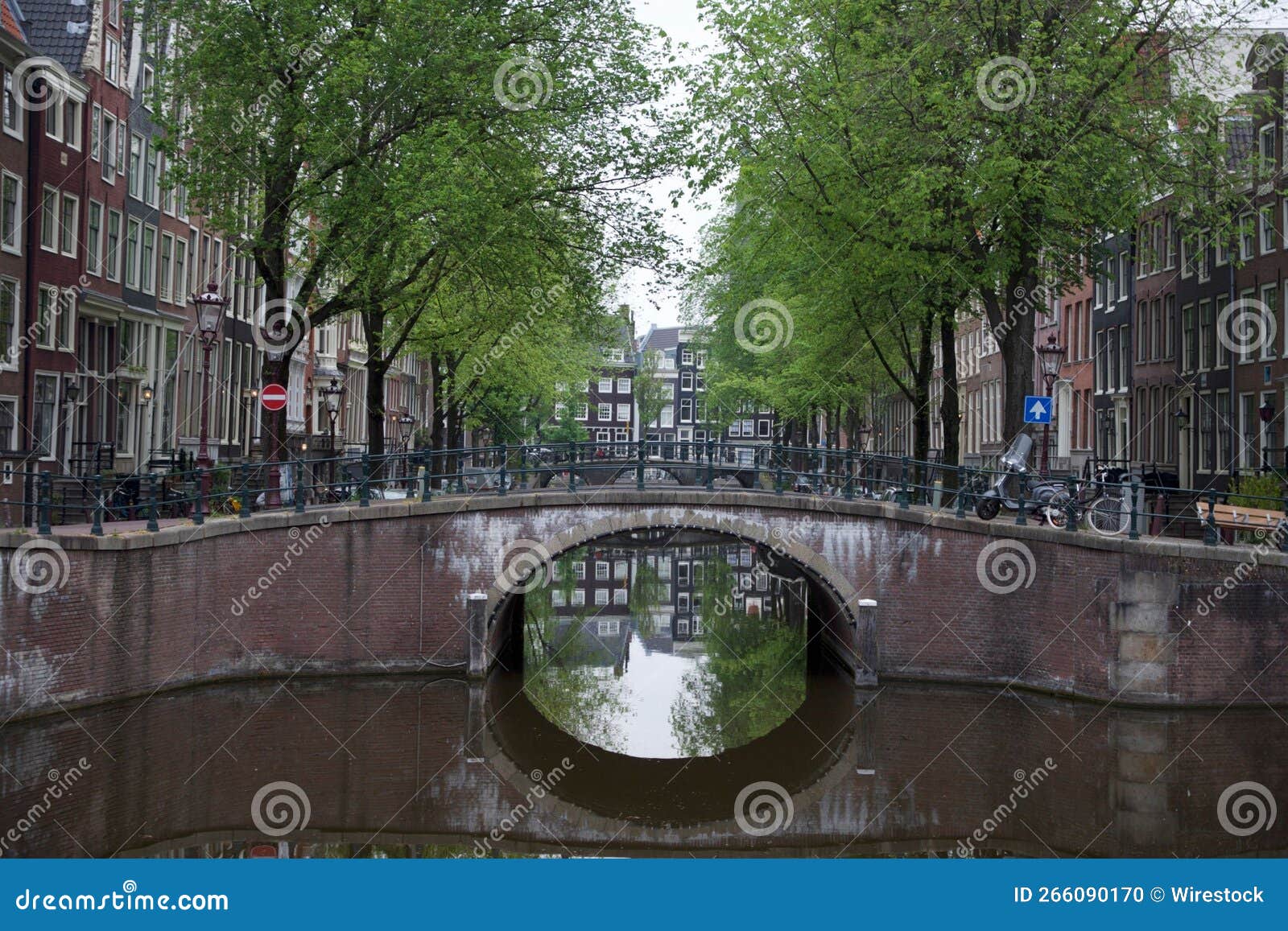 Small Bridge Over a Canal in Amsterdam, the Netherlands. Stock Photo ...