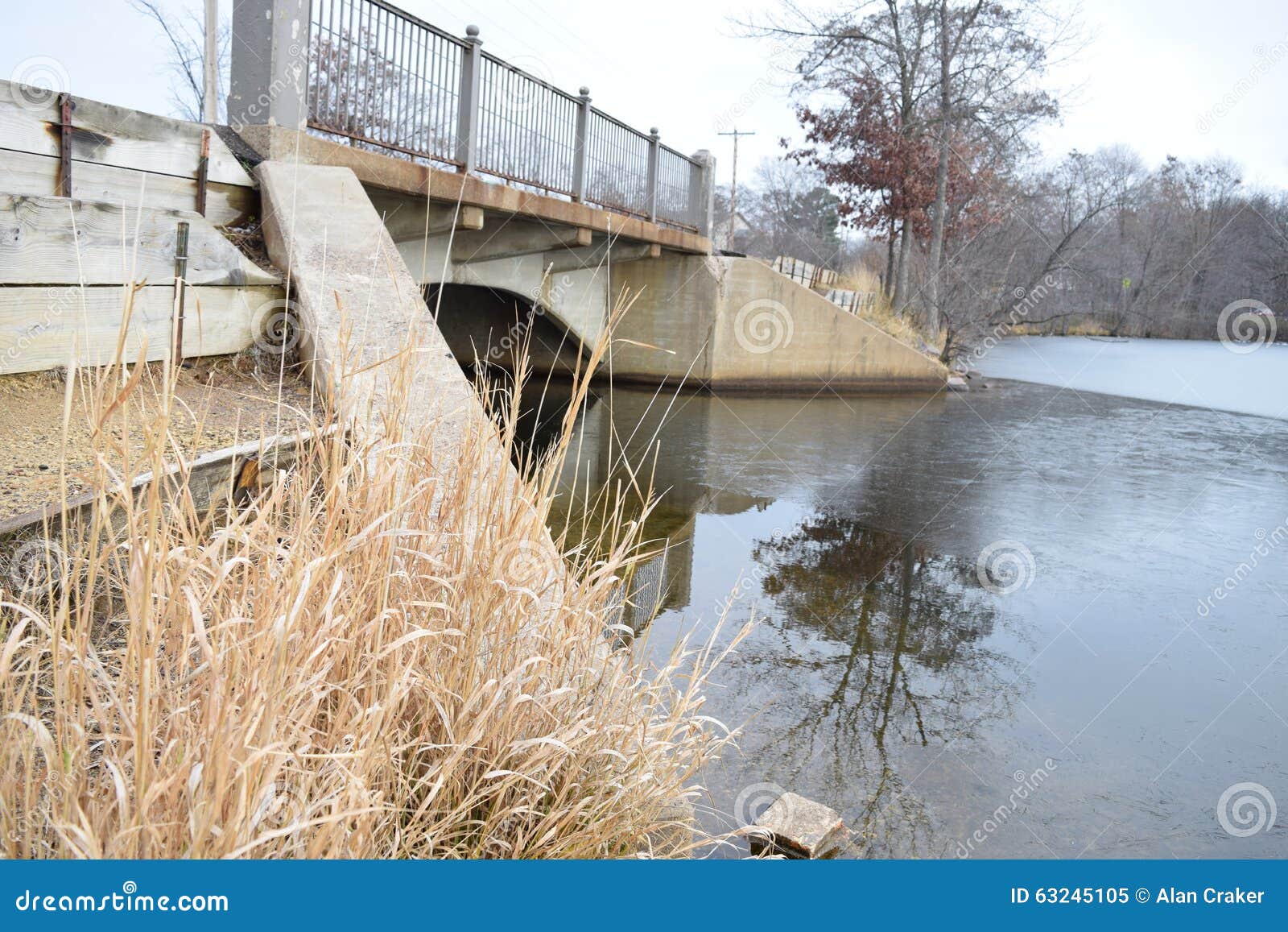 Small Bridge Over Frozen Winter Lake Stock Image - Image of winter ...
