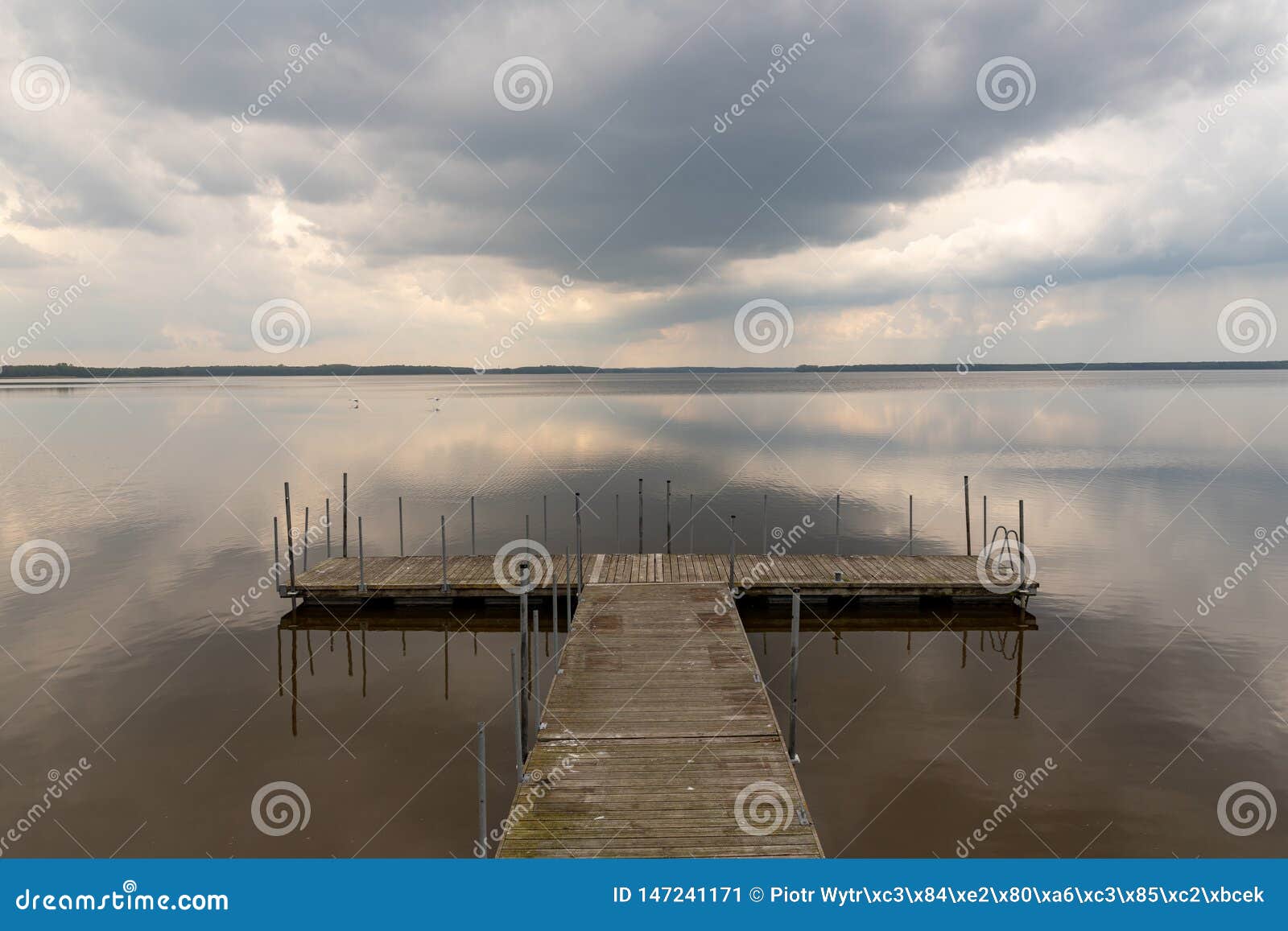 A Small Bridge Over the Lake. Reflection of Clouds on the Lake S ...