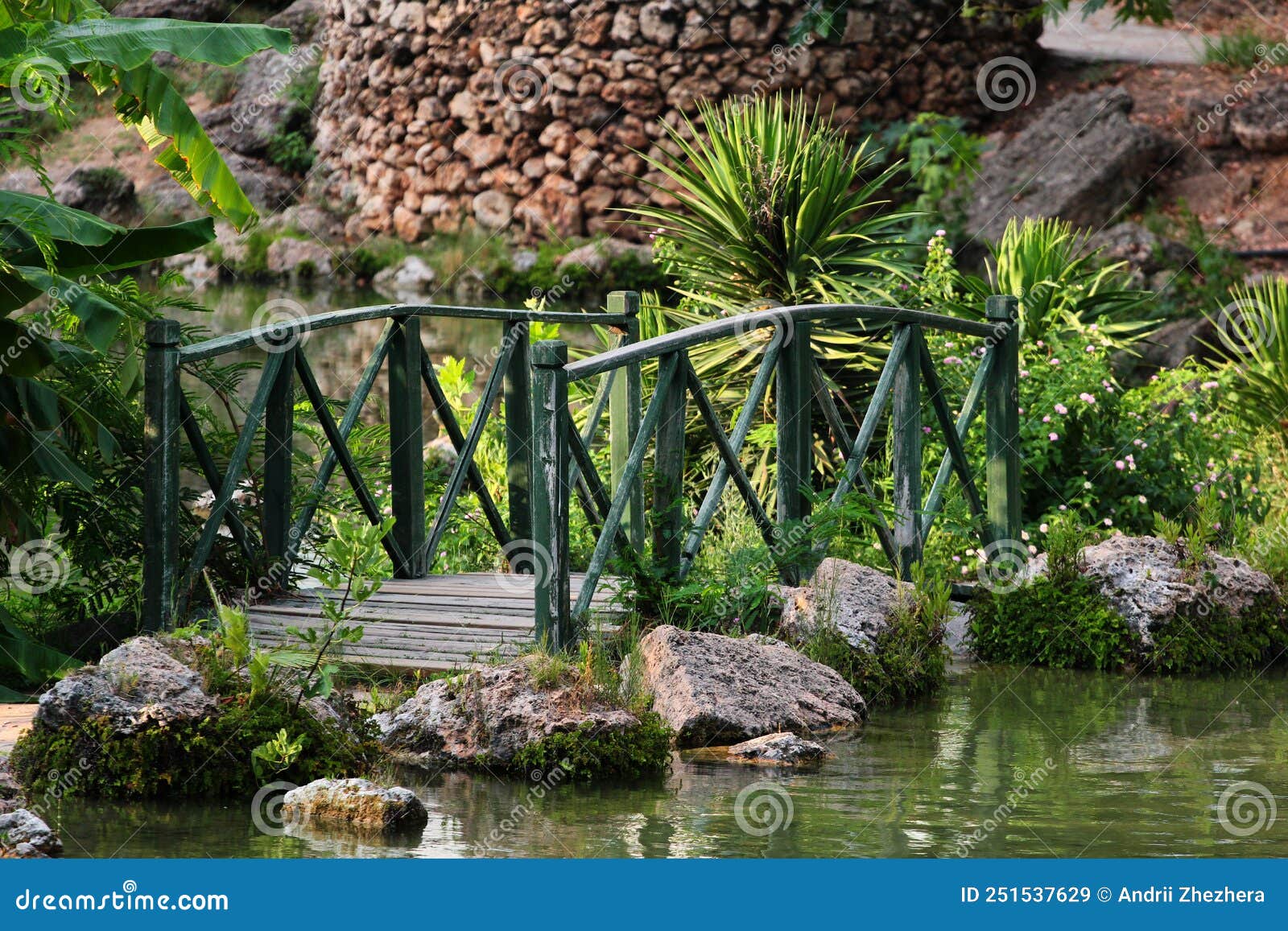 Small Bridge on a Pond in a Garden Stock Image - Image of bridge ...