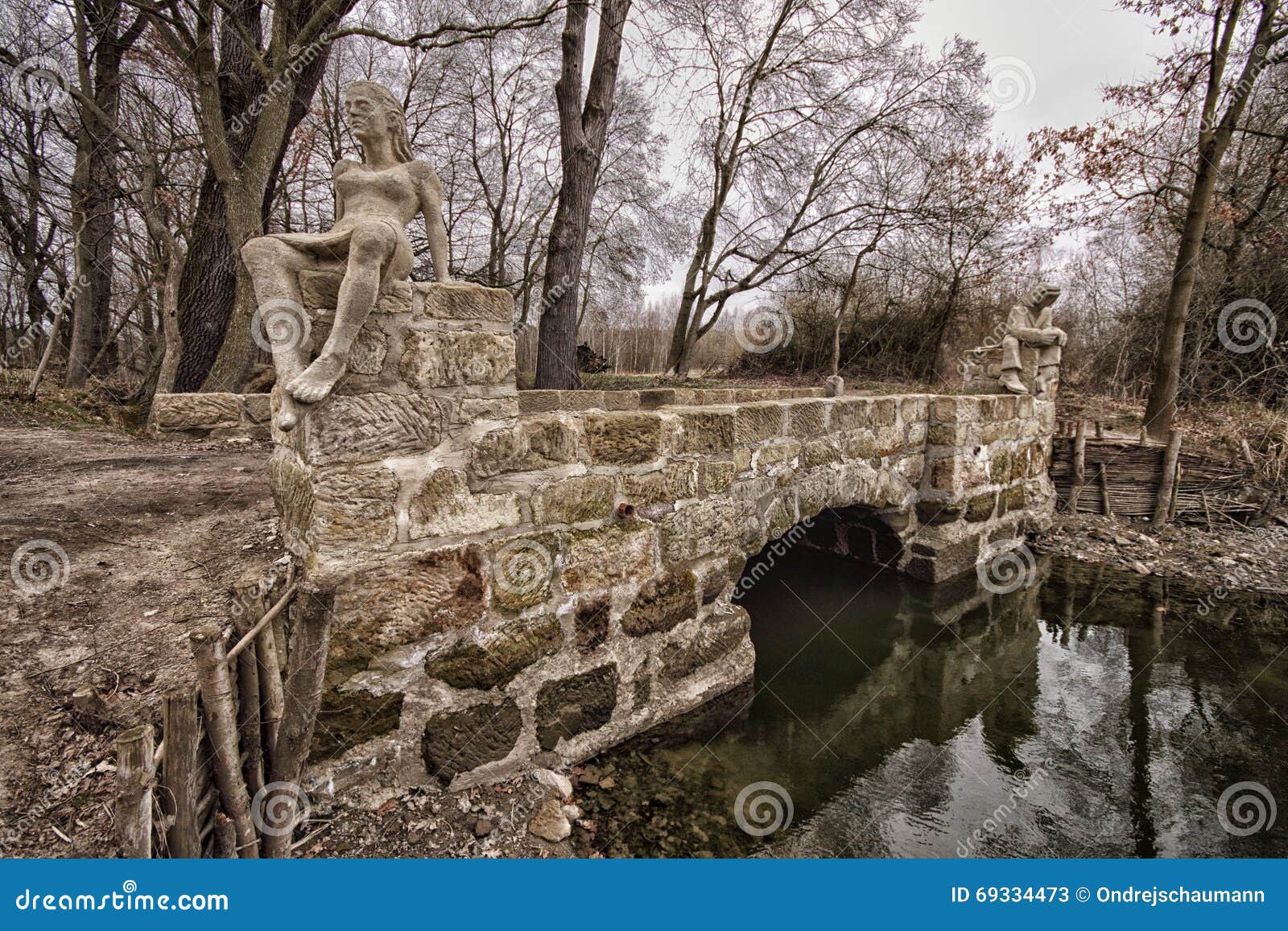 Small bridge with statues stock image. Image of tale - 69334473