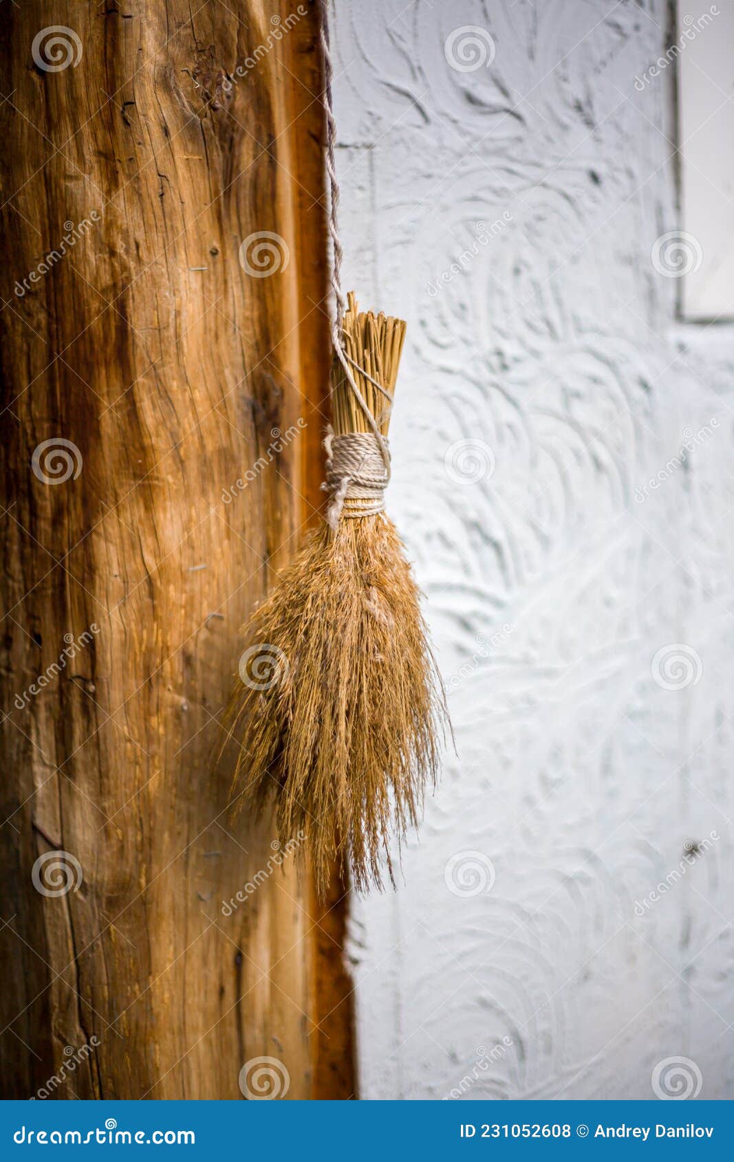 A small broom hanging stock photo. Image of hanging - 231052608