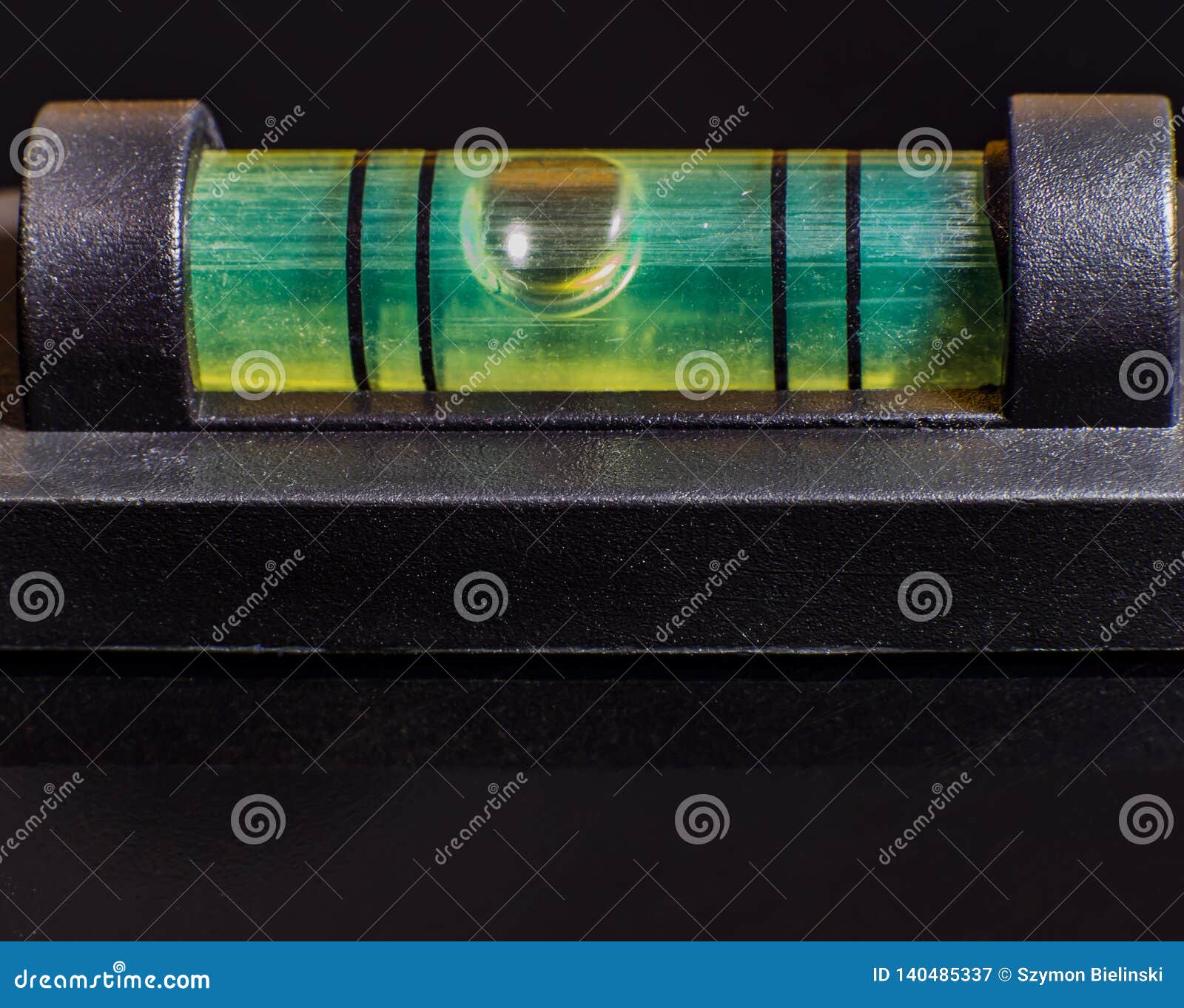 A Small Bubble Level on the Black Stock Image - Image of green, copy ...