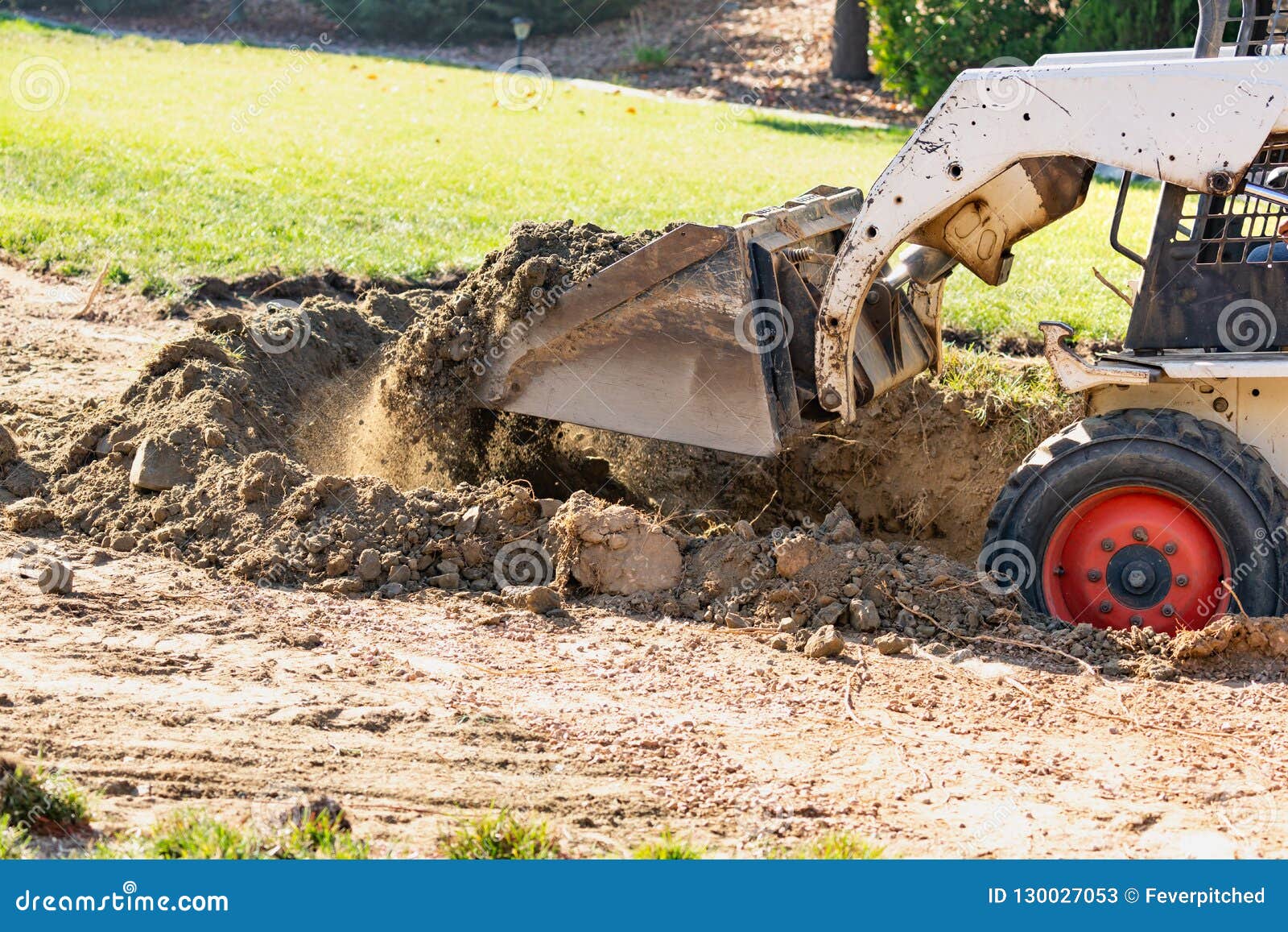 Small Bulldozer Digging in Yard for Pool Installation Stock Image ...