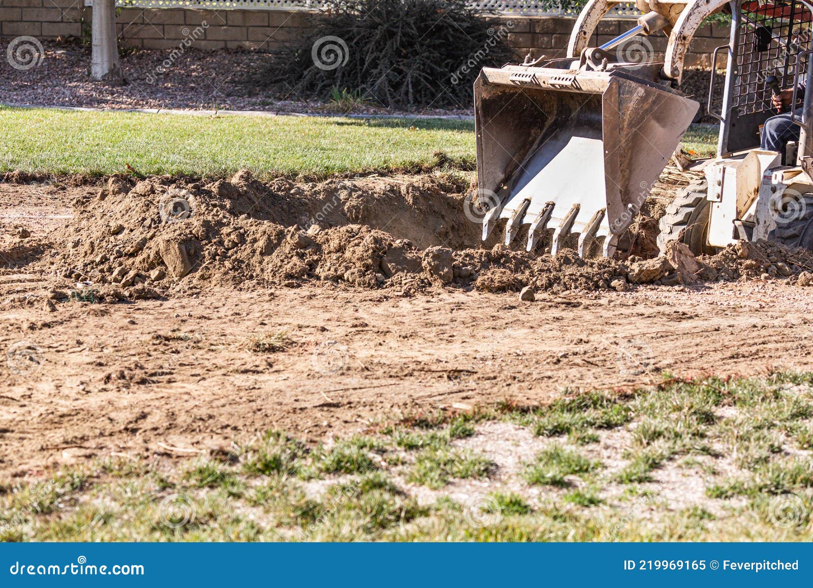 Small Bulldozer Digging in Yard for Pool Installation Stock Image ...