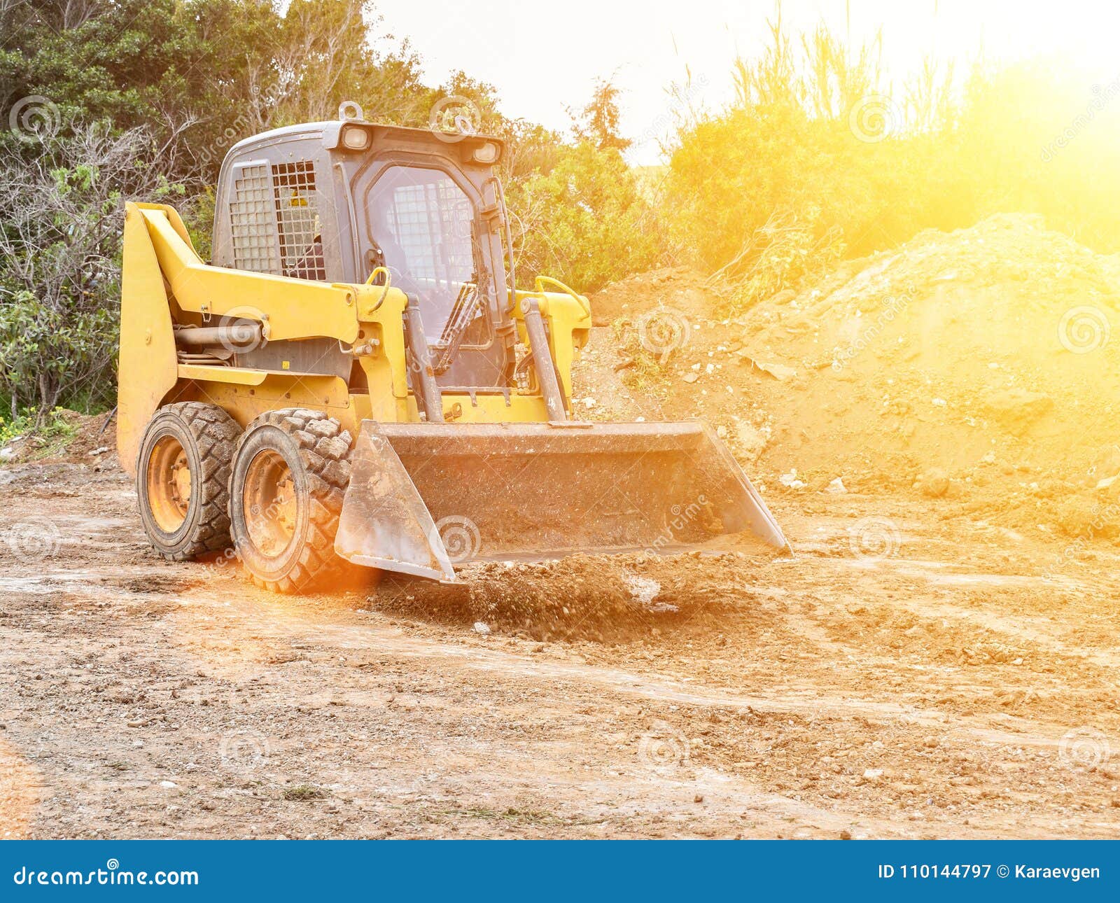 Small bulldozer. Sunny stock image. Image of clear, contractor - 110144797