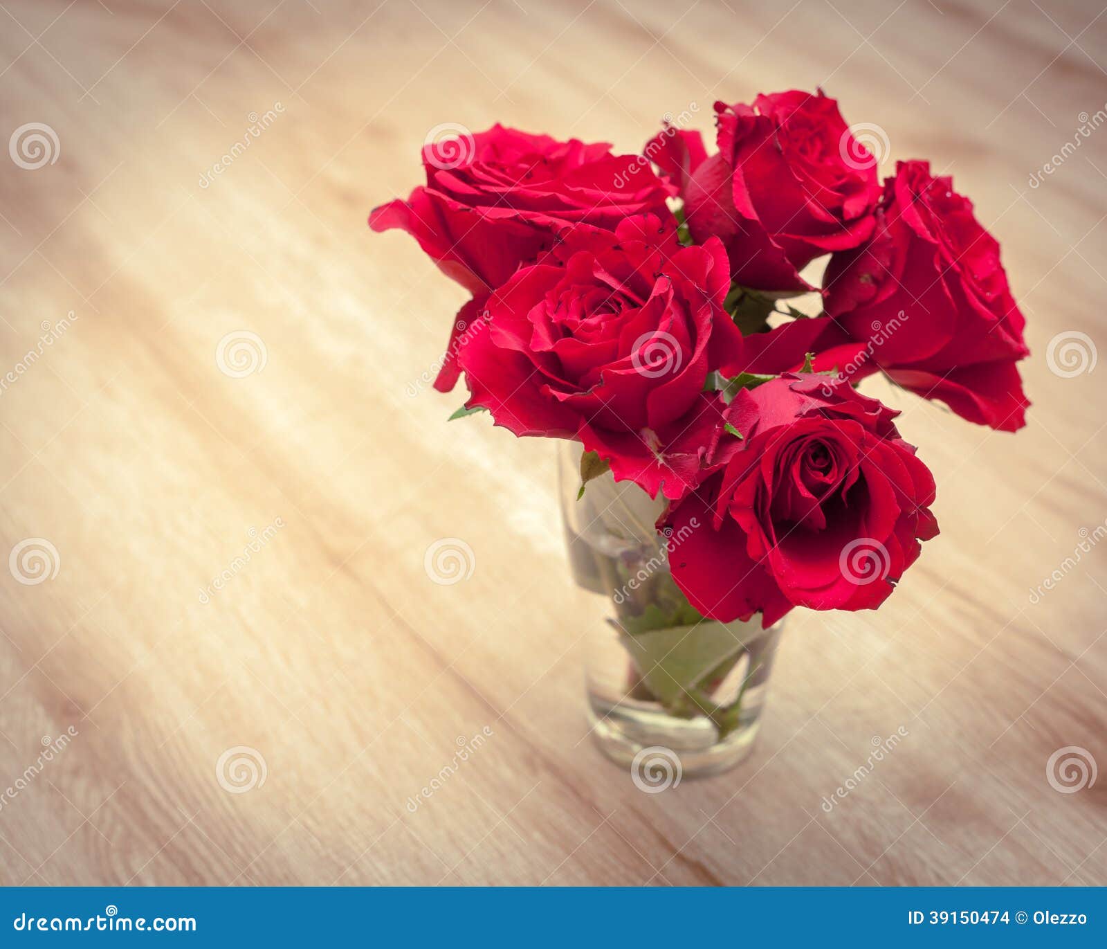 A small bunch of red roses stock photo. Image of retro - 39150474
