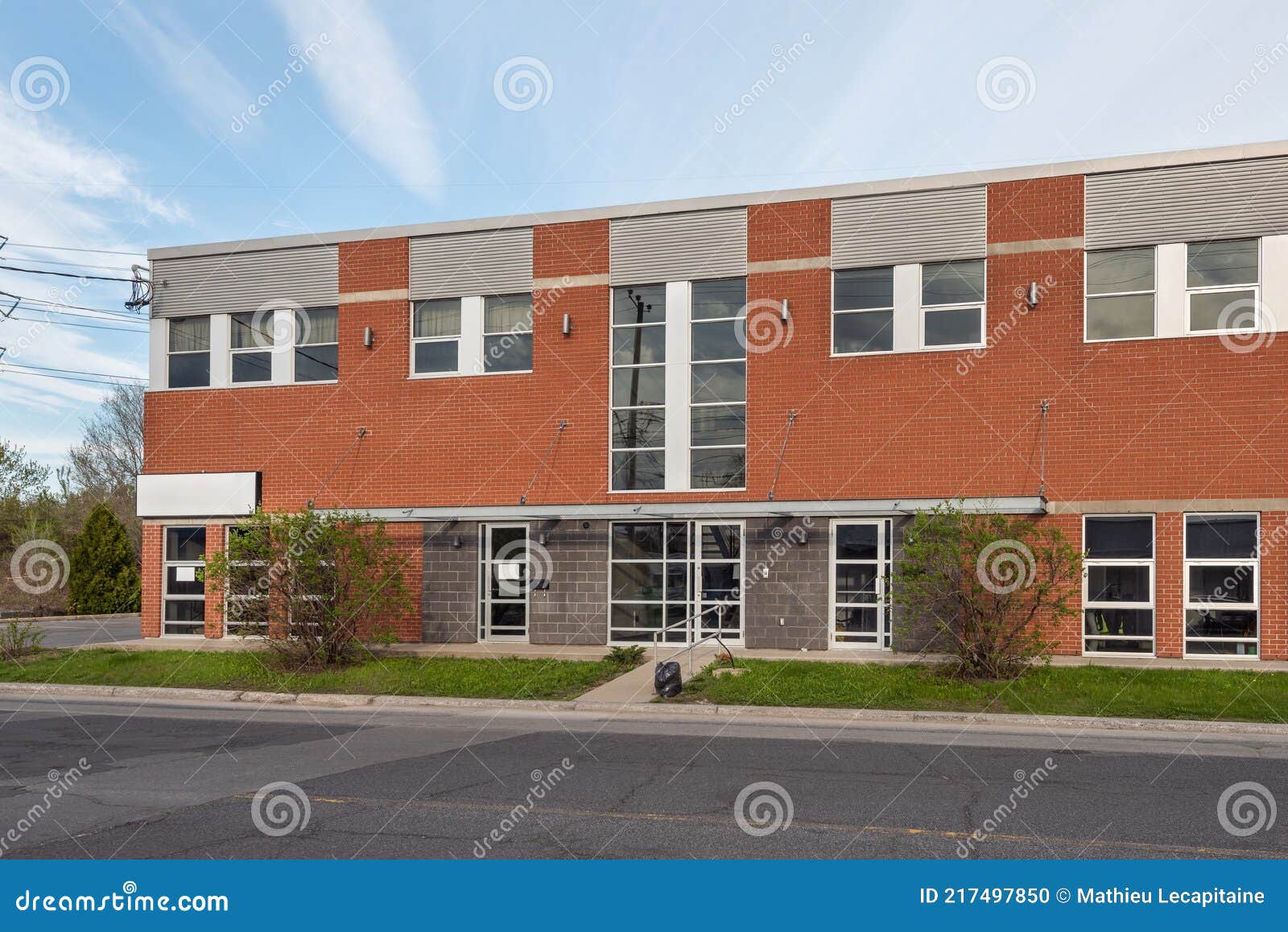 A Small Business Building Exterior Stock Photo - Image of rent ...