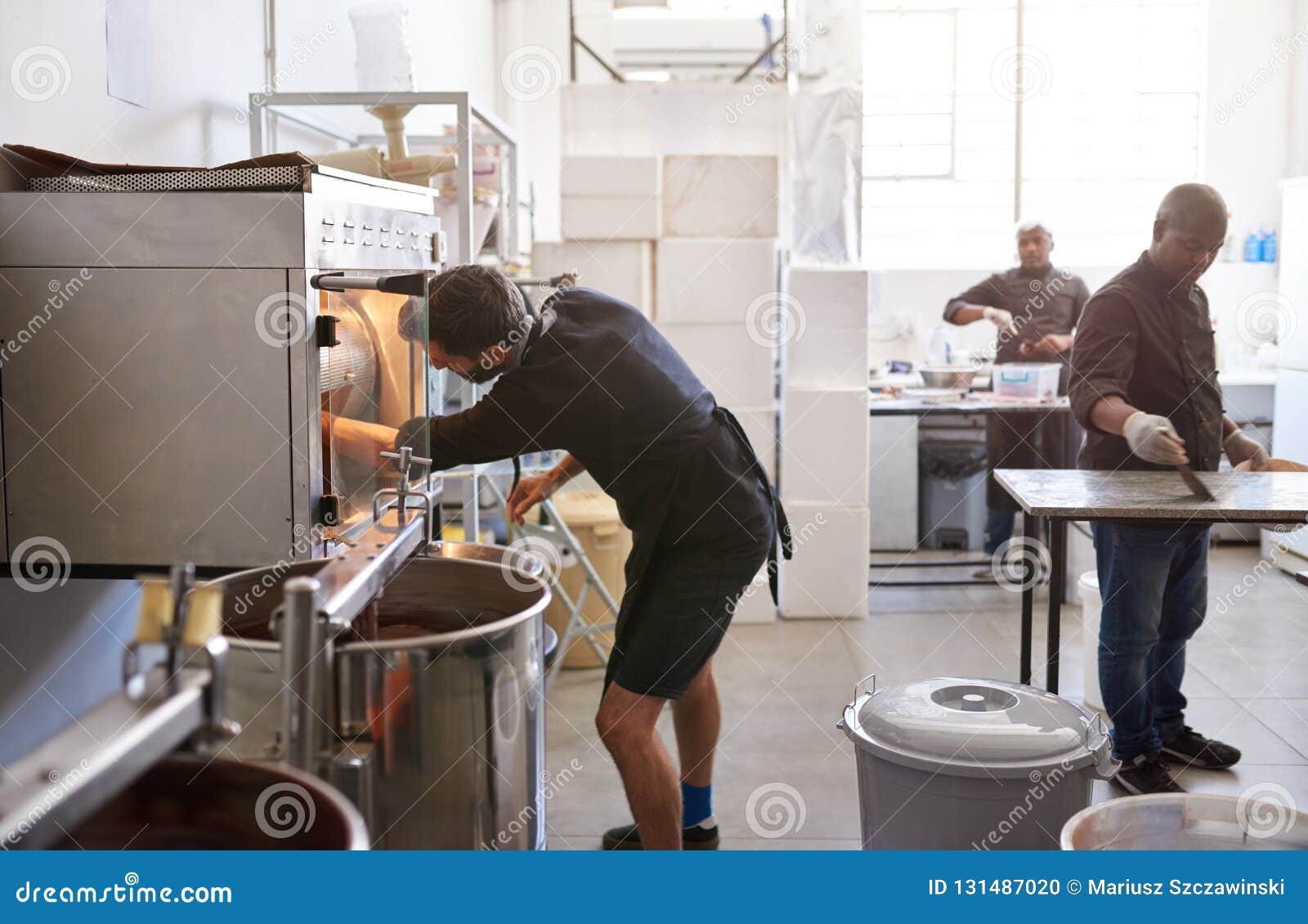 Worker in a Chocolate Factory Roasting Cocoa Beans Stock Photo - Image ...