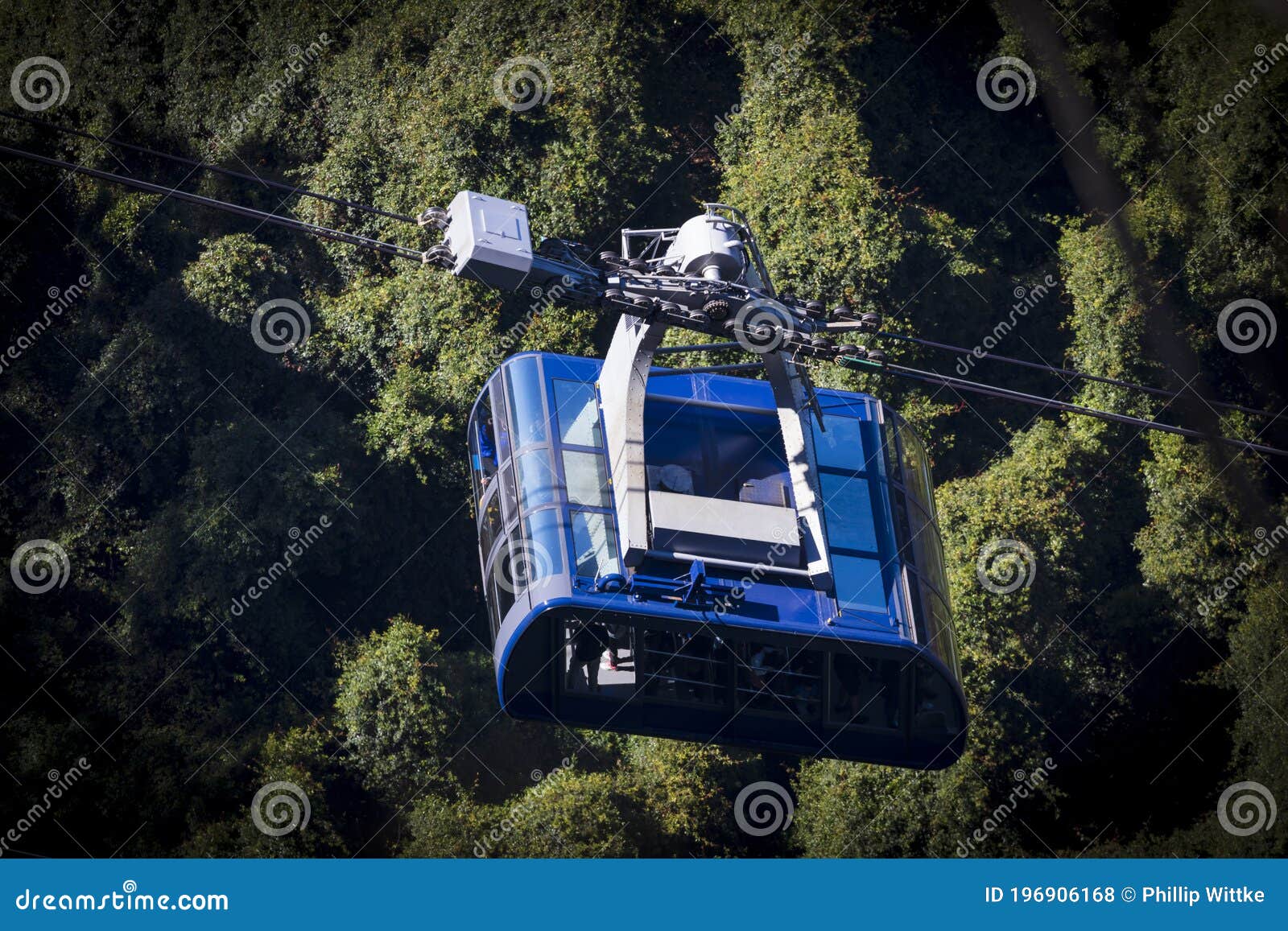 A Small Cable Car On Tegelbergbahn Is Climbing The Mountain Tegelberg ...