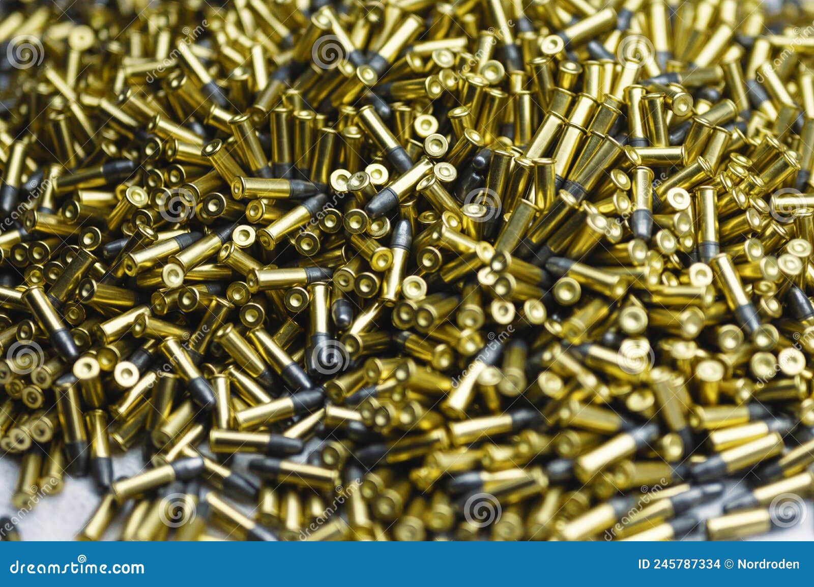Small-caliber Bullets on White Table at Production Plant Stock Photo ...