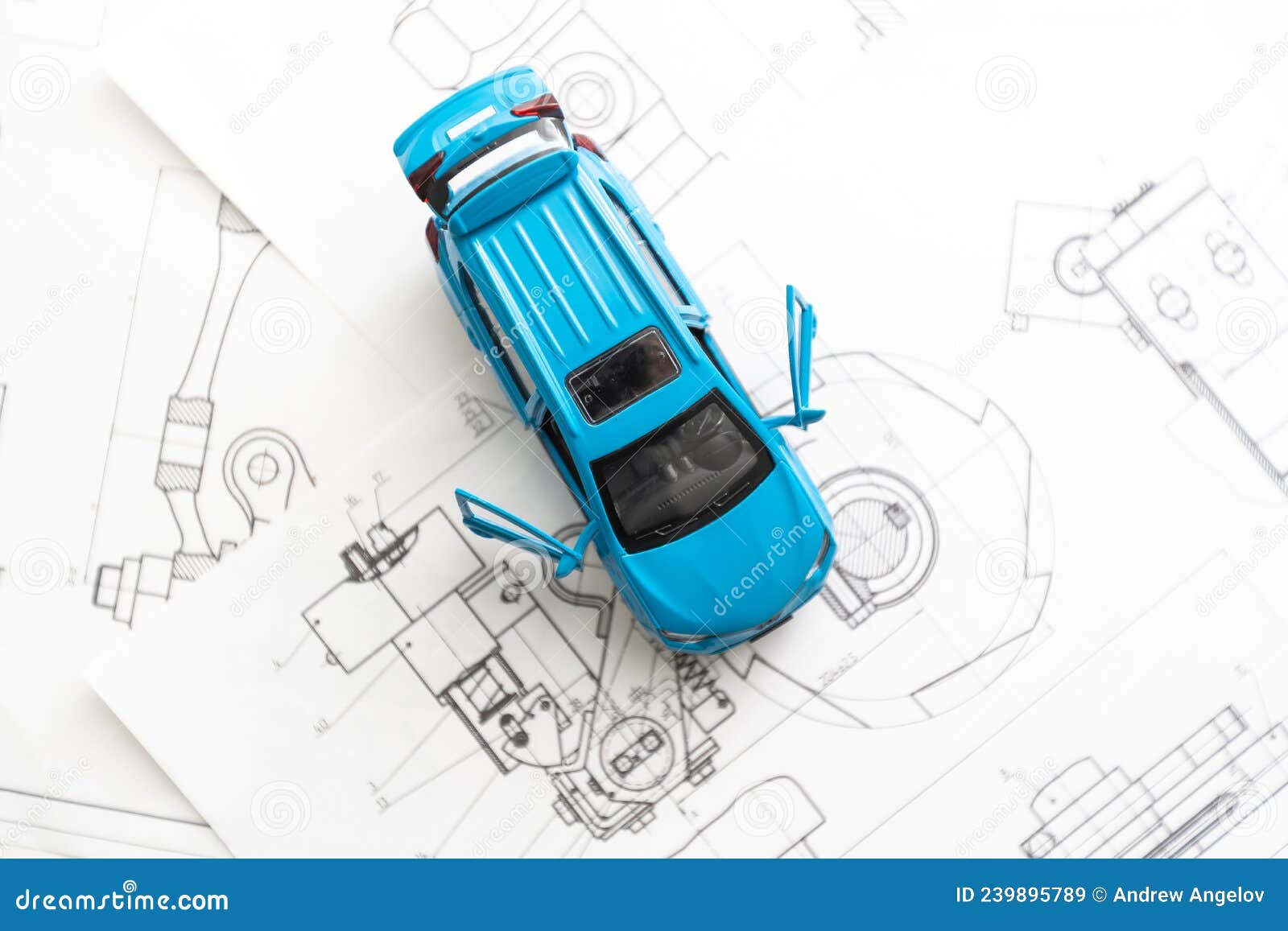 Small Car Model and Blueprint Sheets Stock Image - Image of page ...