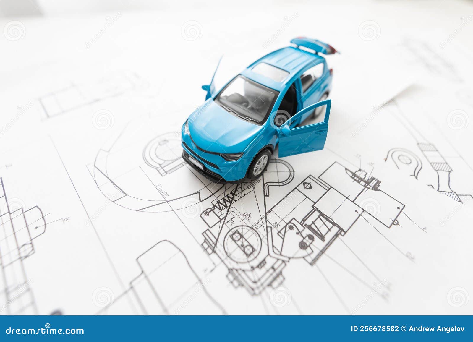 Small Car Model and Blueprint Sheets. Stock Photo - Image of ...
