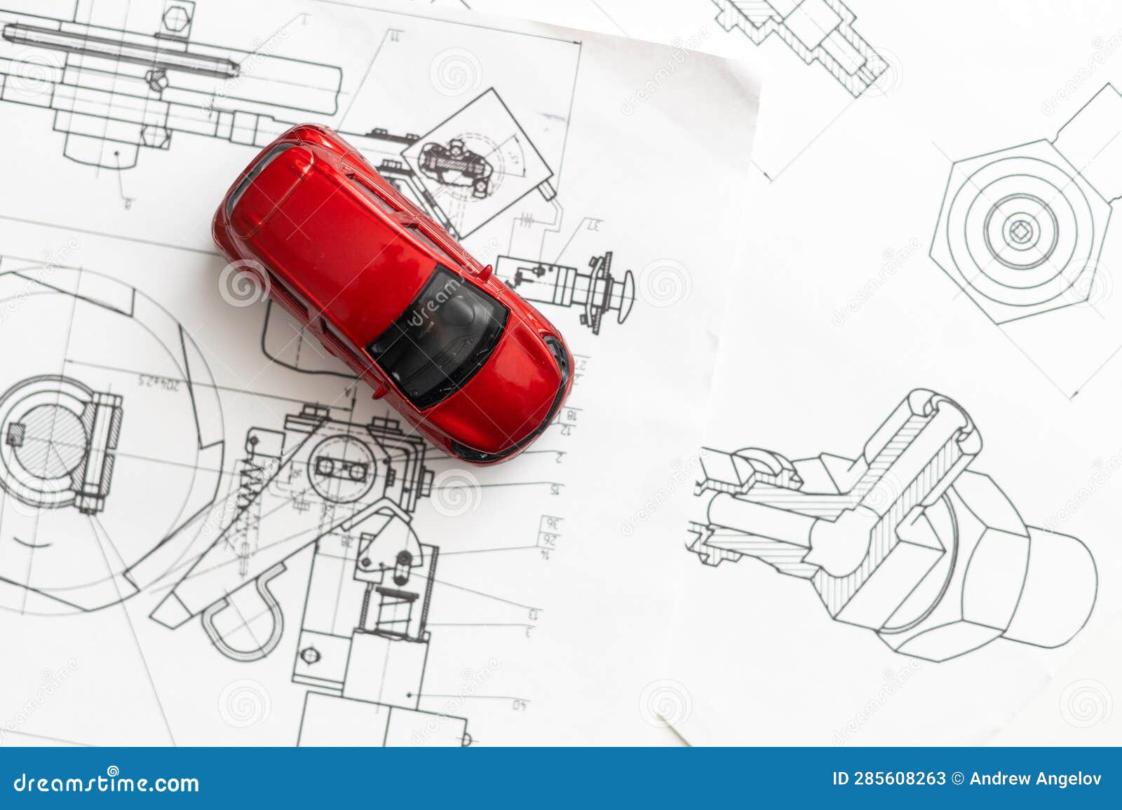 Small Car Model and Blueprint Sheets. High Quality Photo Stock Image ...
