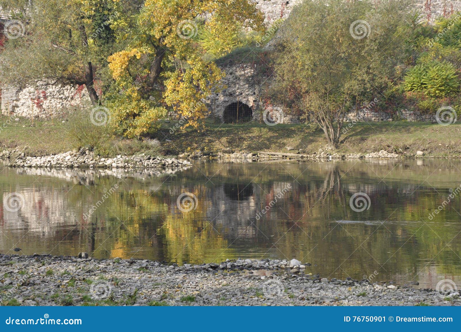 A Small Cave on the Bank of the River. Stock Image - Image of eyes ...