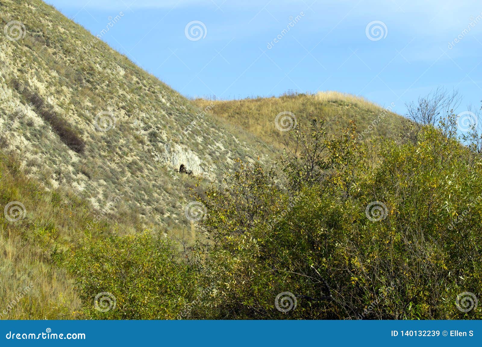 A Small Cave in the Yellow Shale Mountain Stock Image - Image of ...