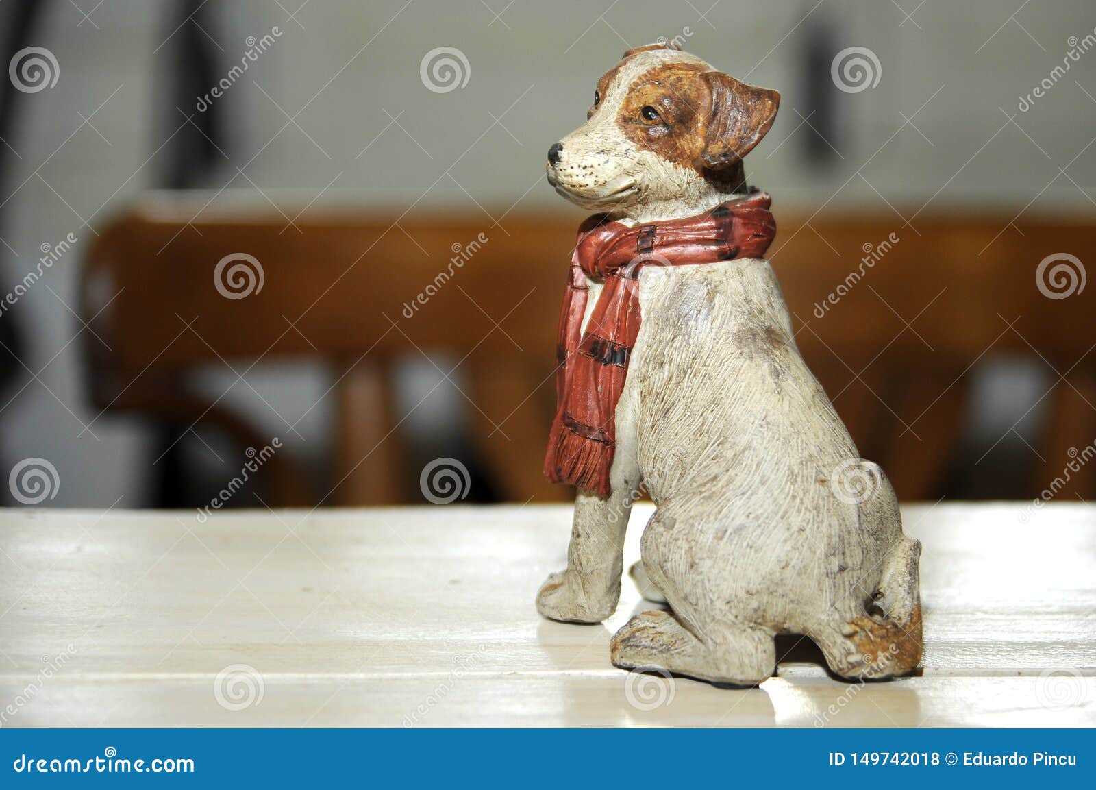 Ceramic figure of a dog stock photo. Image of scarf - 149742018