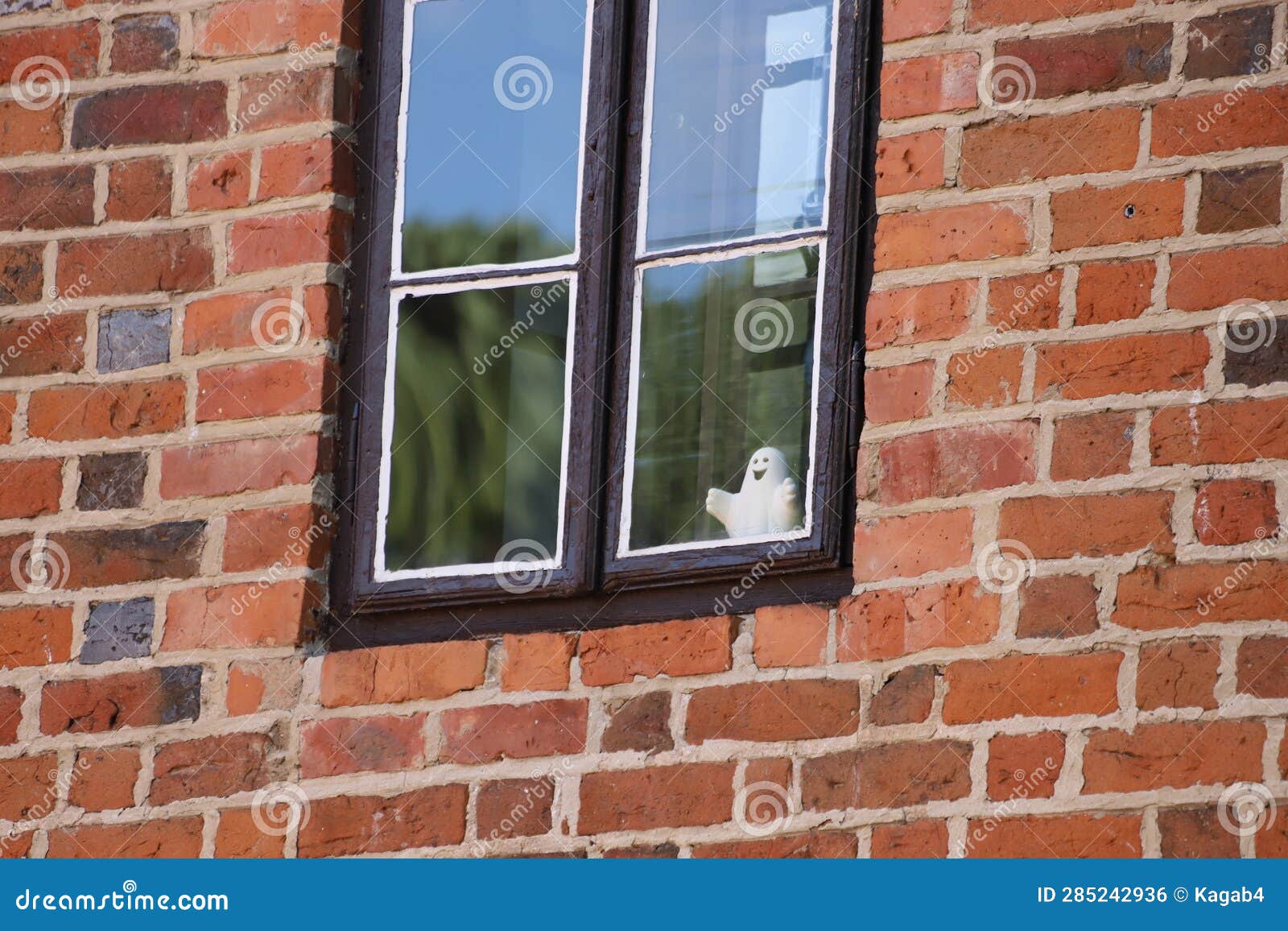A Small Ceramic Ghost in the Window. Brick Wall Stock Photo - Image of ...