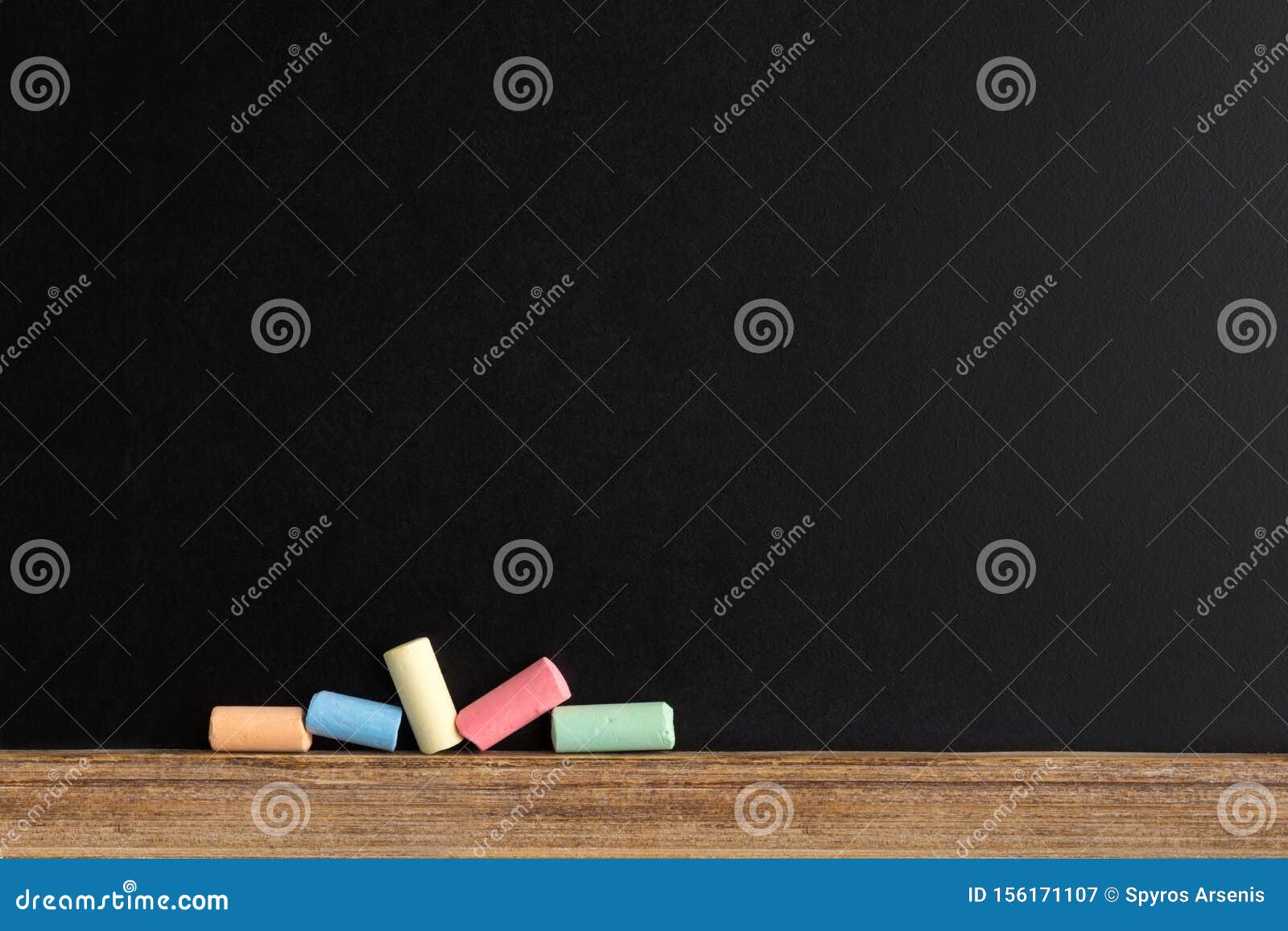 Small Chalk Pieces in Different Colors on a Blackboard Stock Image ...
