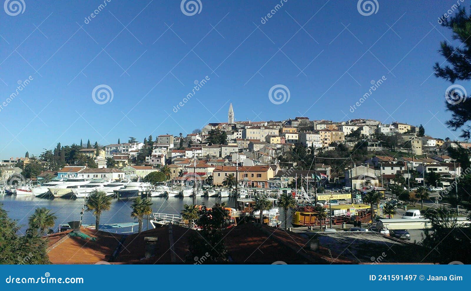 A small seaside town stock image. Image of boat, waterway - 241591497