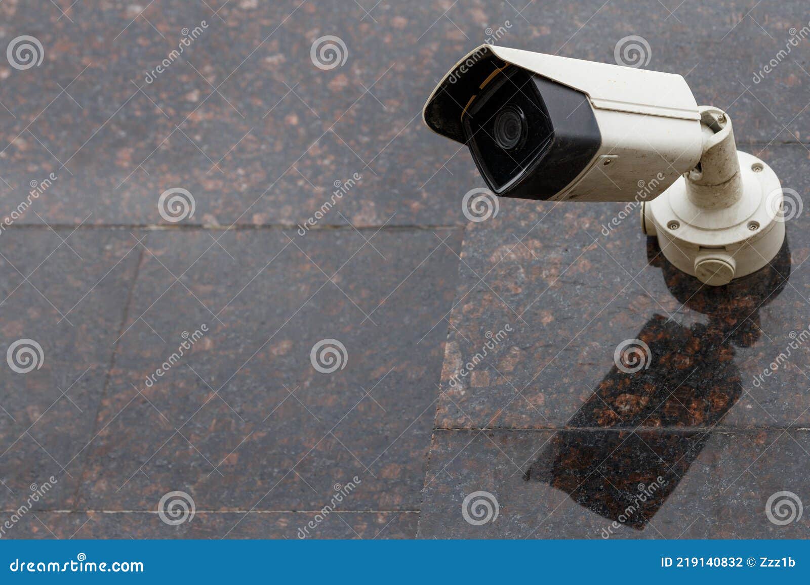 Small Cheap Surveillance Camera on Tan Brown Granite Wall Stock Photo ...