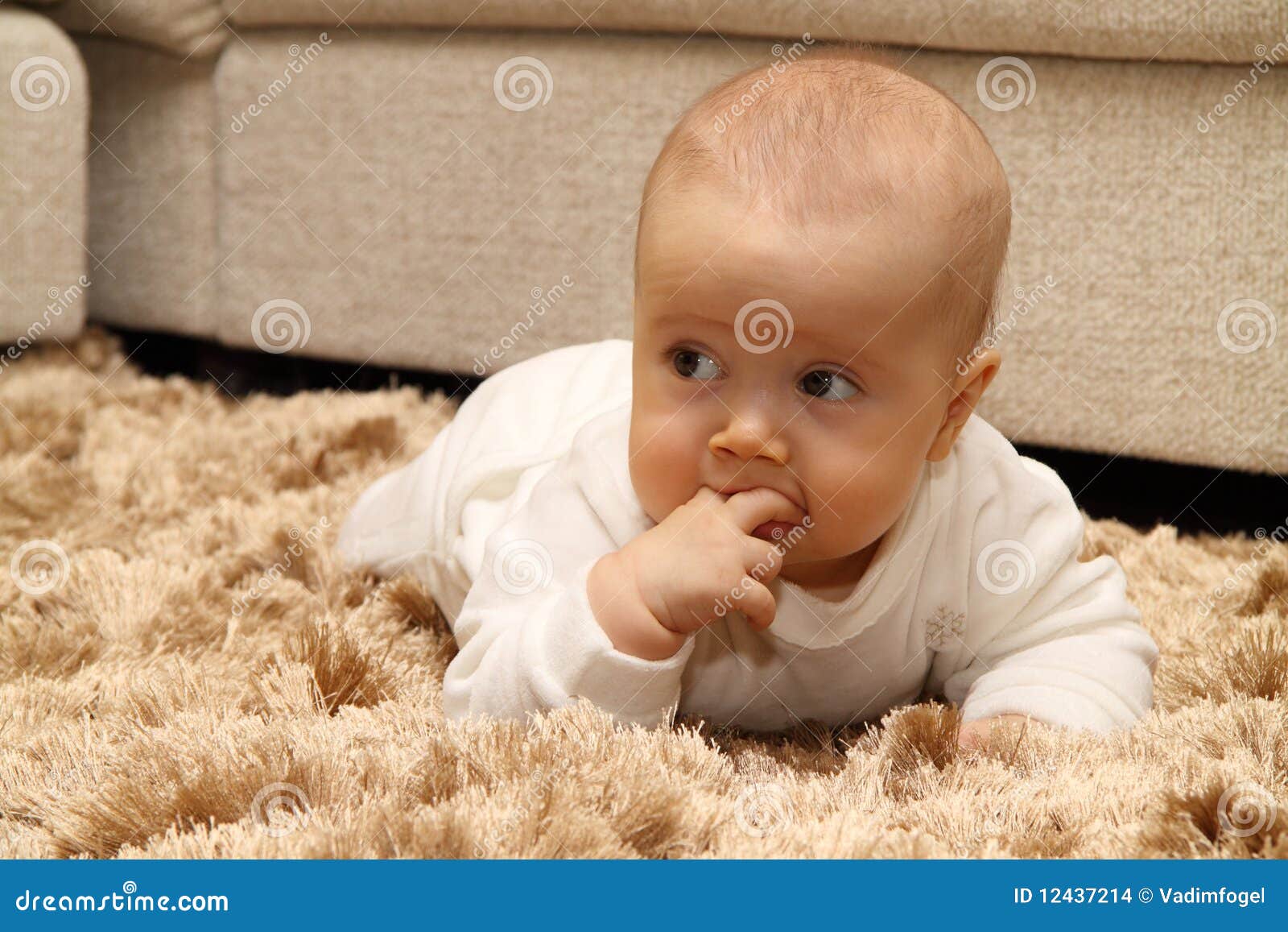 Small child on carpet stock photo. Image of human, crawling - 12437214