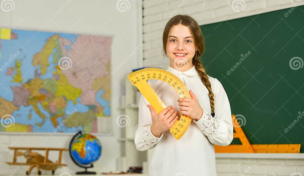 Small Child Holding Ruler for Mathematics Lesson. Science and ...