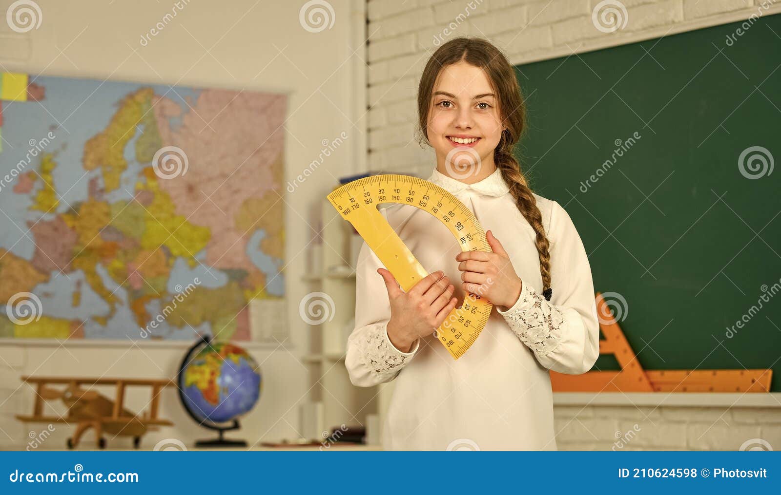 Small Child Holding Ruler for Mathematics Lesson. Science and ...