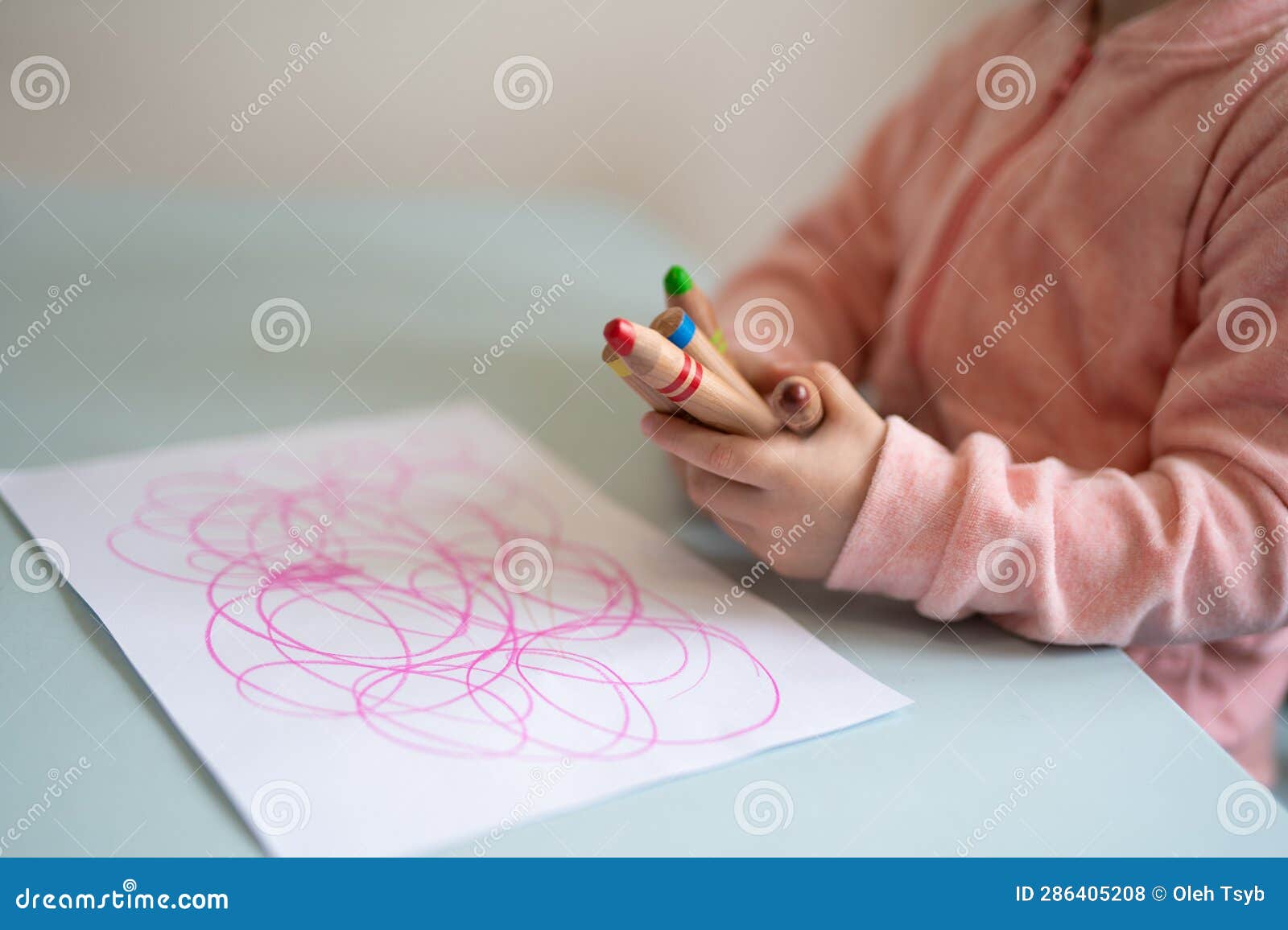 A Small Child is Learning To Draw a Picture Stock Photo - Image of ...